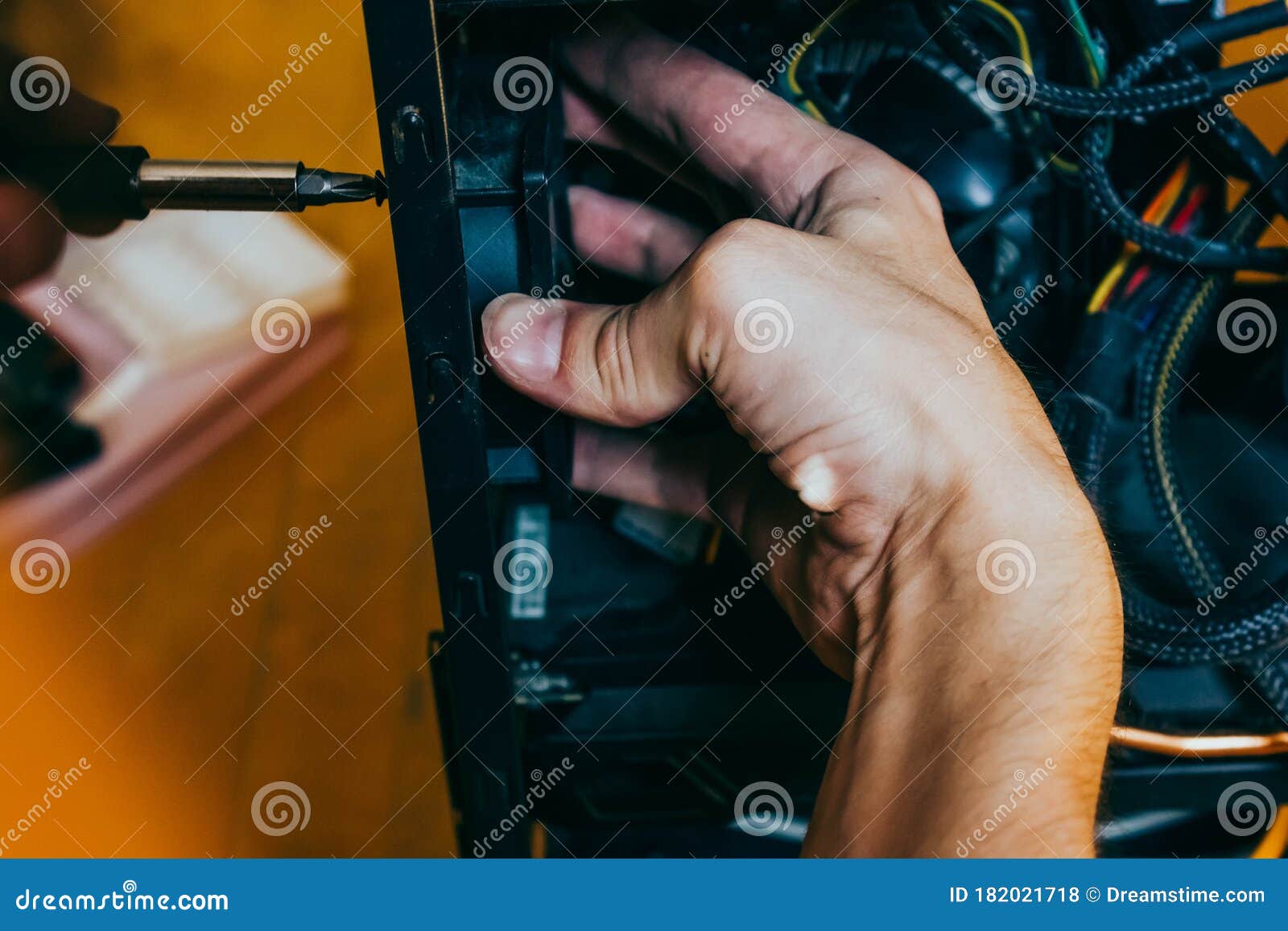 Senior Male Tech Works in Hardware Repair Facility.guy is Assembling a ...