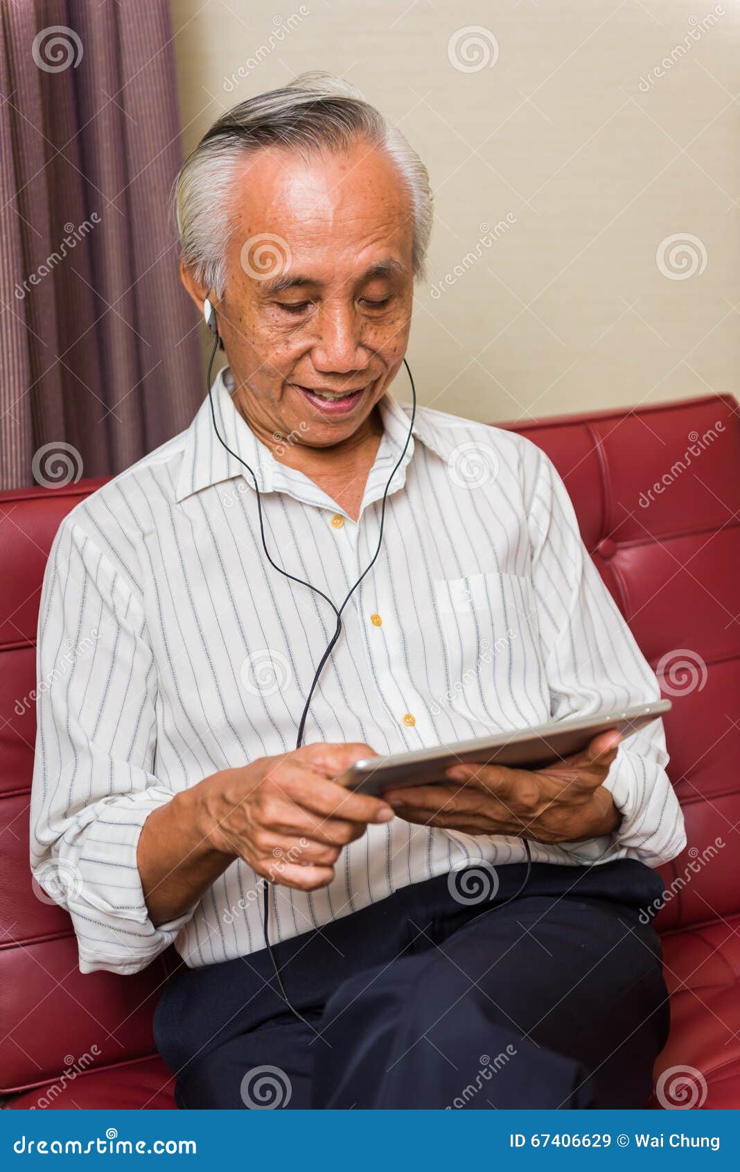 Senior Male Using Technology for Entertainment Stock Image - Image of ...