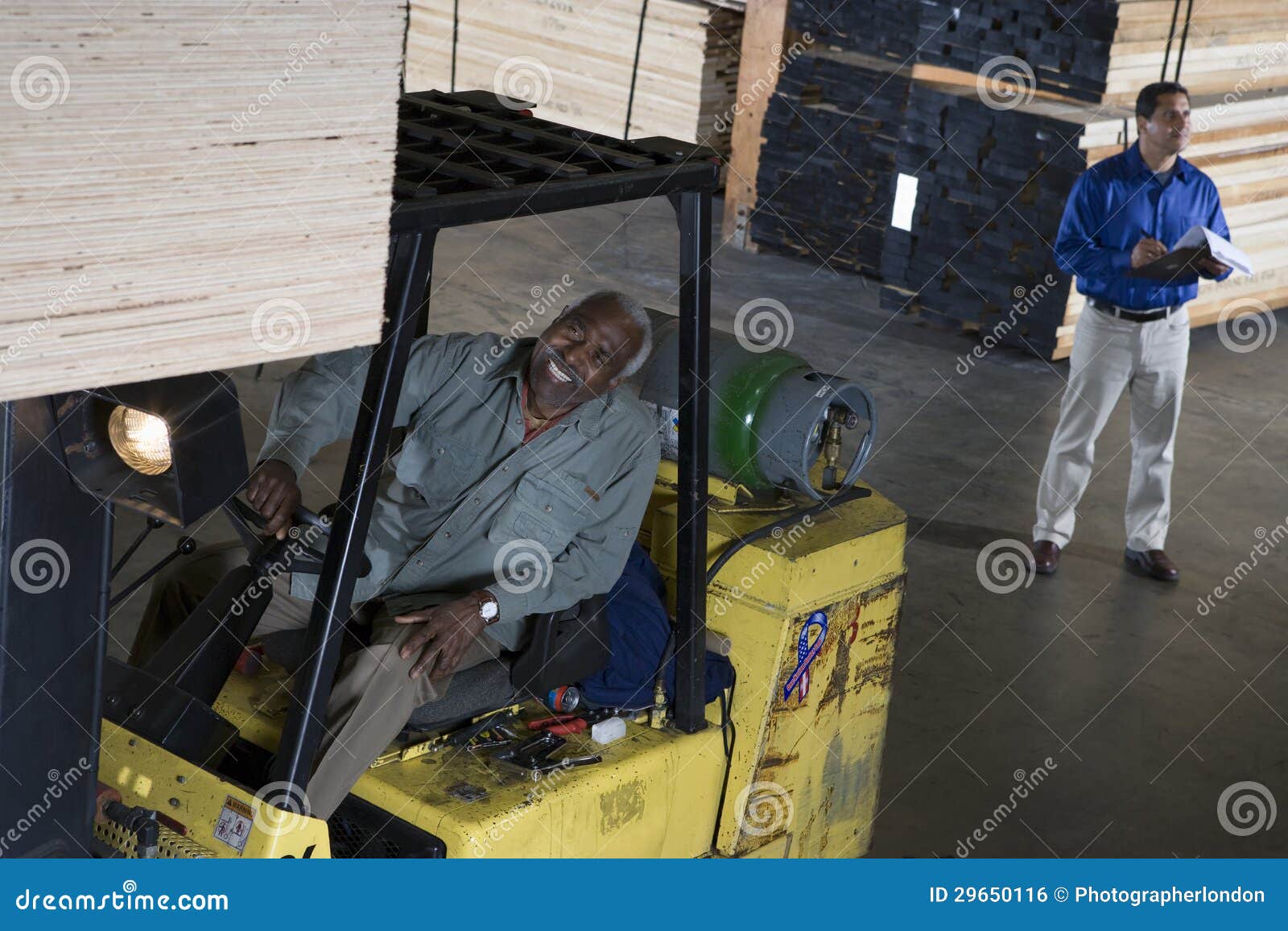 Senior Male Worker Stacking Wooden Planks Stock Photo - Image of ...