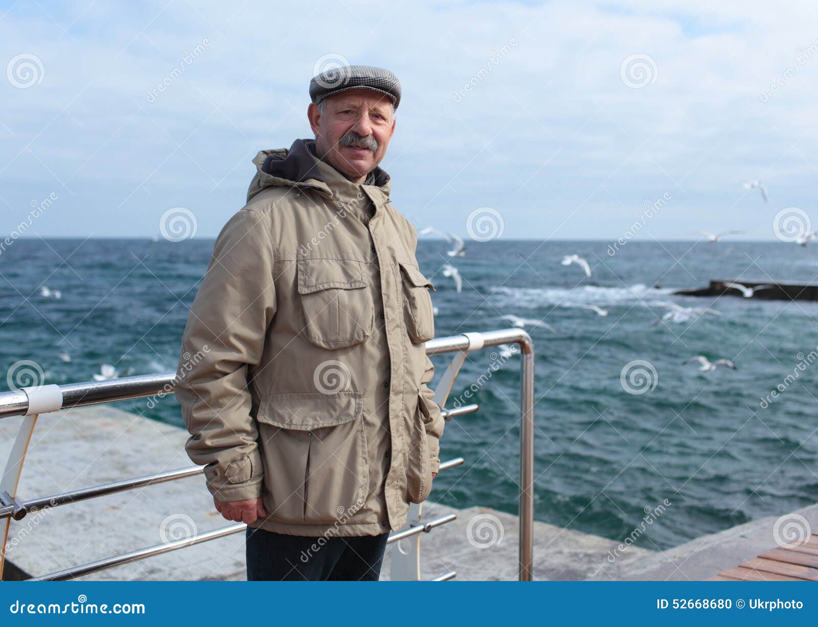 Senior man against the sea stock photo. Image of copy - 52668680