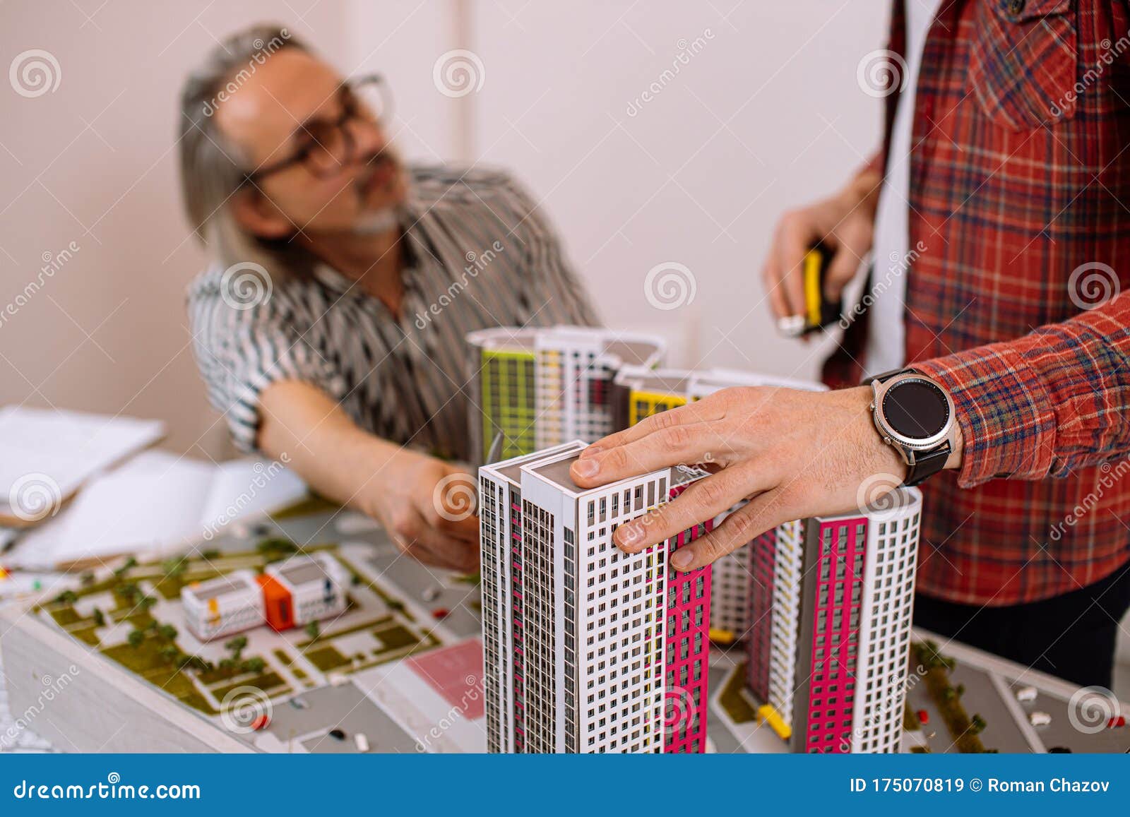 Senior Man Architect Controls the Process of Creating Building Model by ...