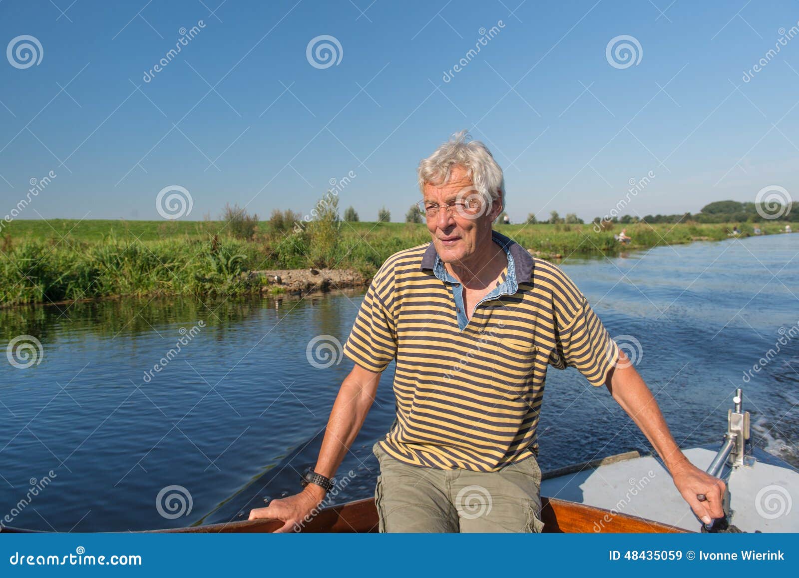 Senior Man in Boat on River Stock Image - Image of recreation, person ...