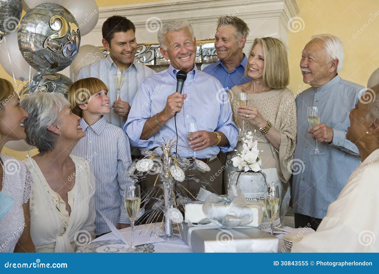 Senior Man Celebrating Retirement With Family And Friends Royalty Free ... Senior Man Celebrating Retirement With Family And Friends Royalty Free ...