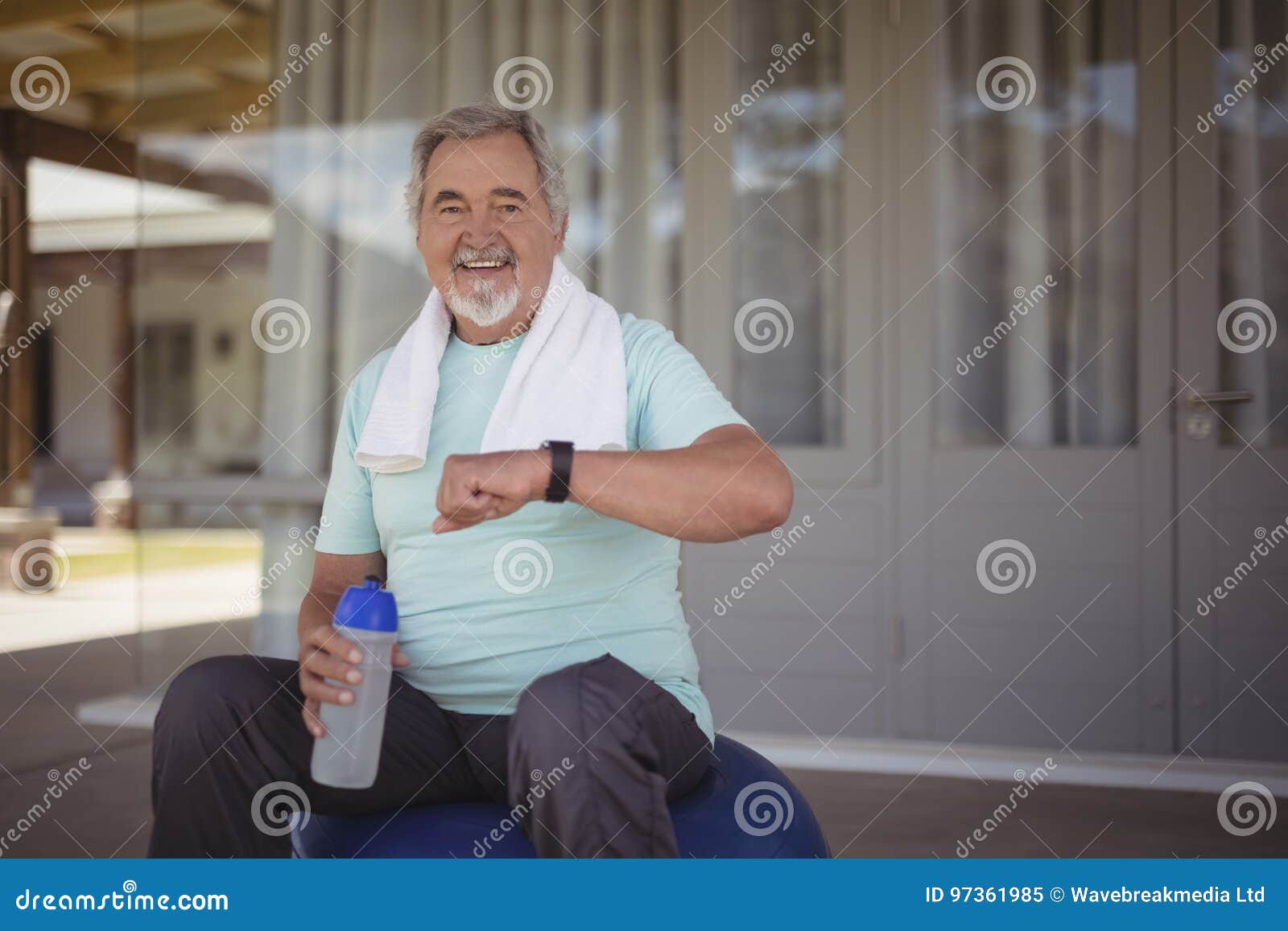 Senior Man Checking Time on Wristwatch after Work Out Stock Image ...
