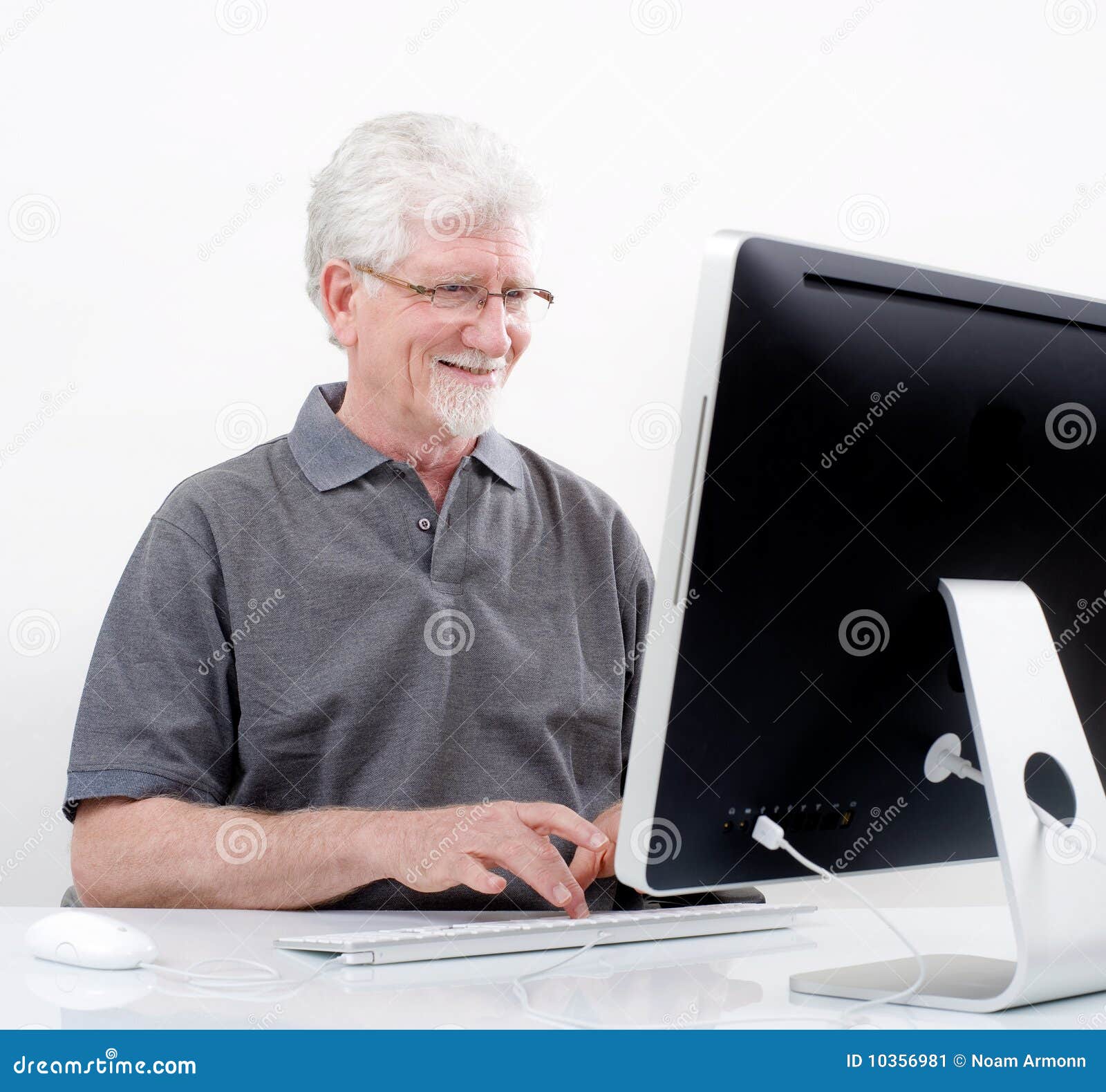 Senior man with computer stock image. Image of online - 10356981