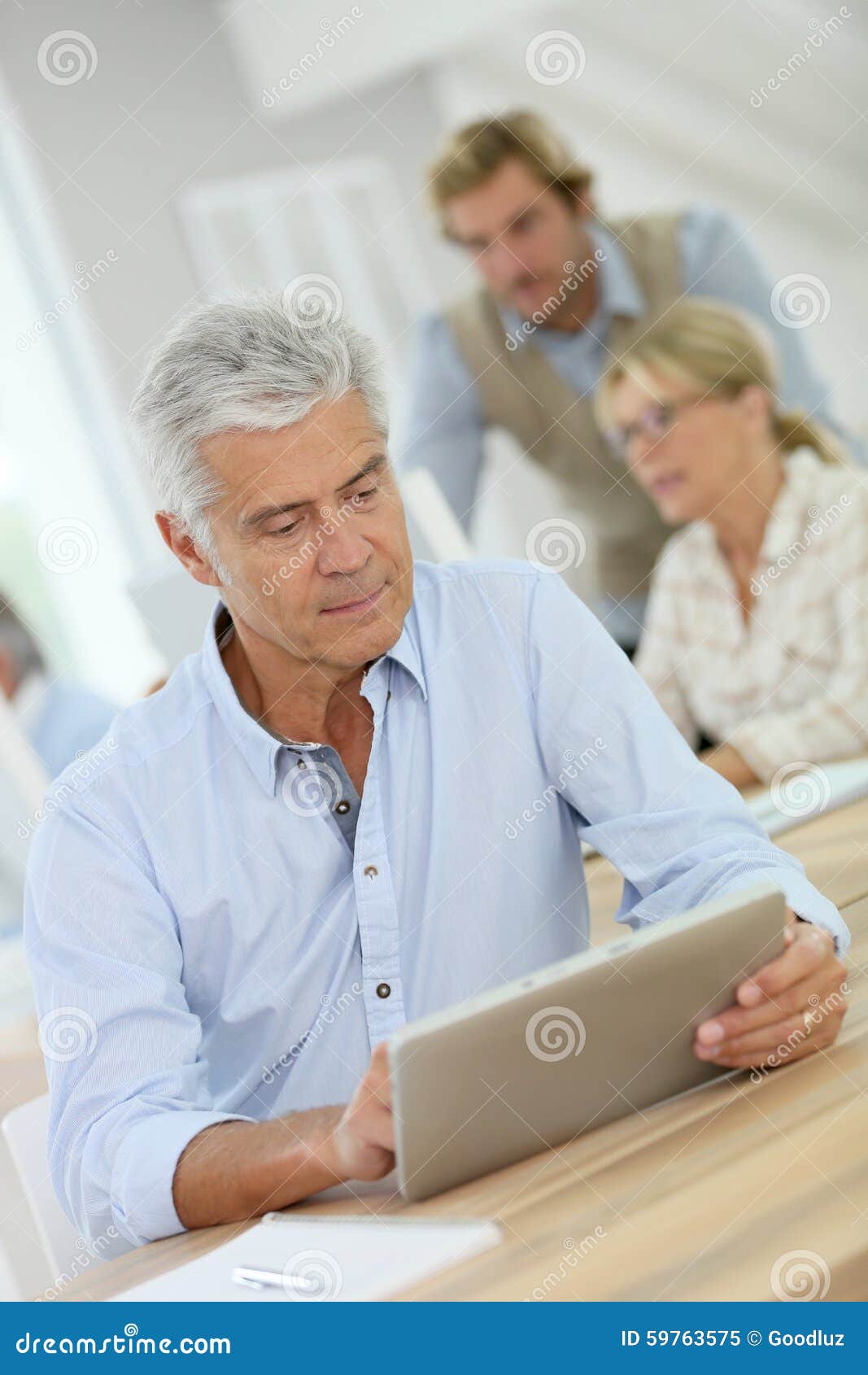 Senior Man in Computing Class Amongst Others Stock Image - Image of ...