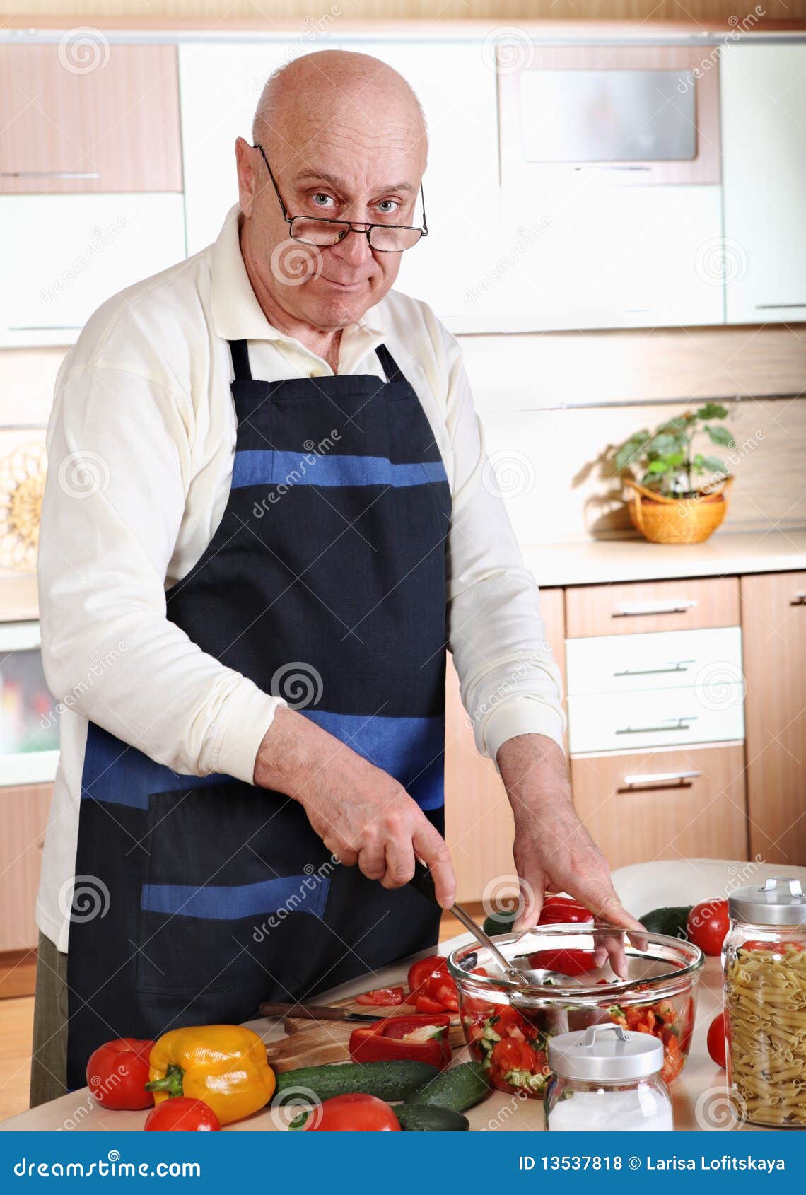 Senior Man Cooking in Kitchen Stock Photo - Image of smiling, cooking ...