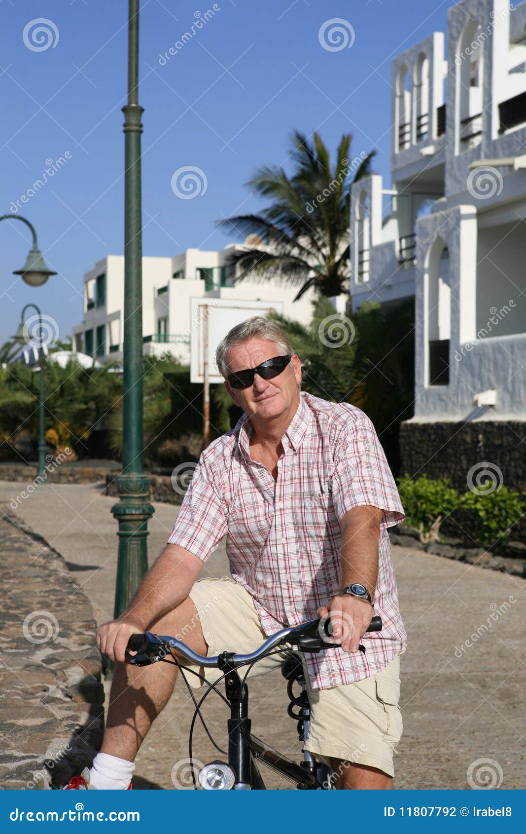 Senior Man on Cycle Ride stock photo. Image of beach - 11807792