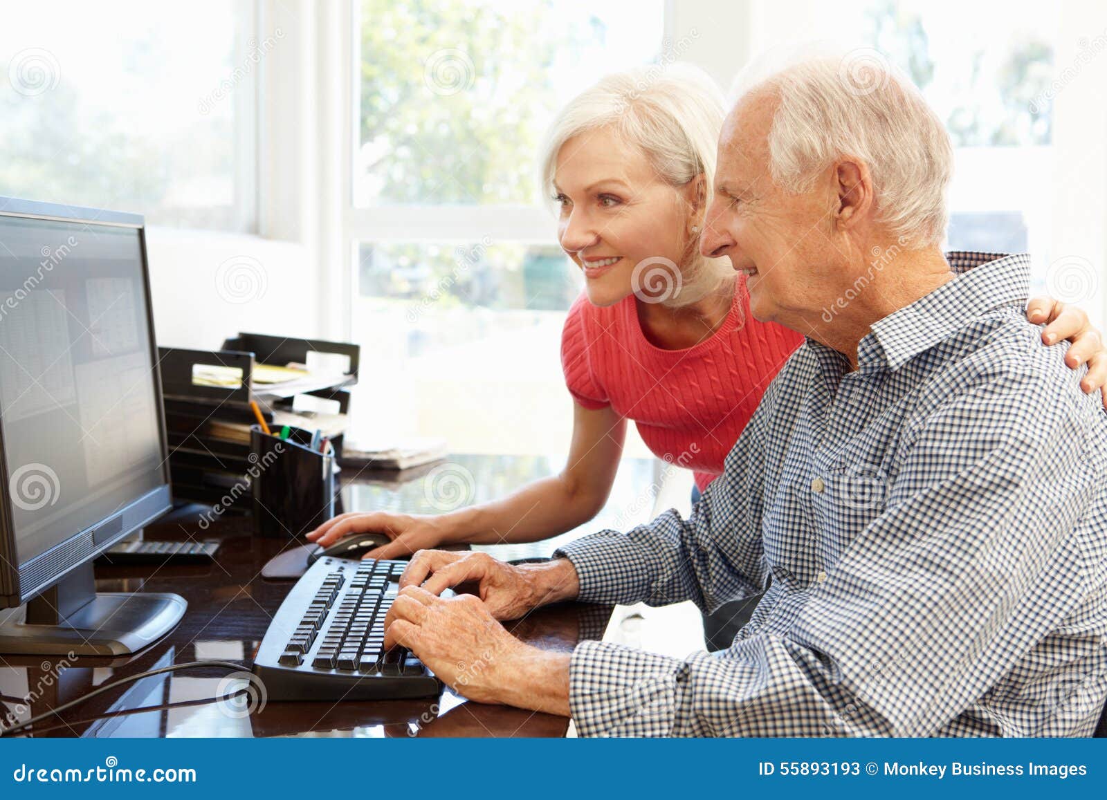Senior Man and Daughter Using Computer at Home Stock Image - Image of ...