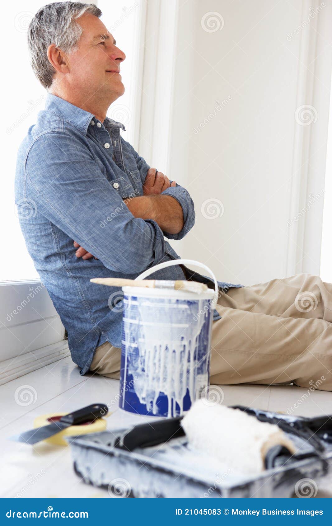 Senior Man Decorating House Stock Image - Image of enjoying ...