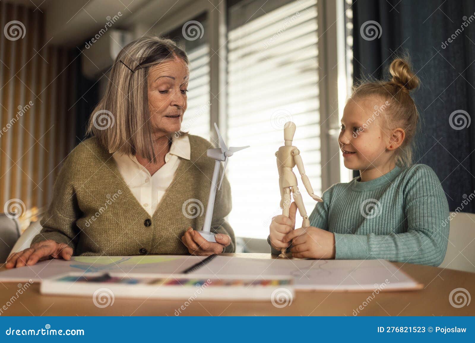 Senior Man Doing Homework with His Granddaughter. Stock Image - Image ...