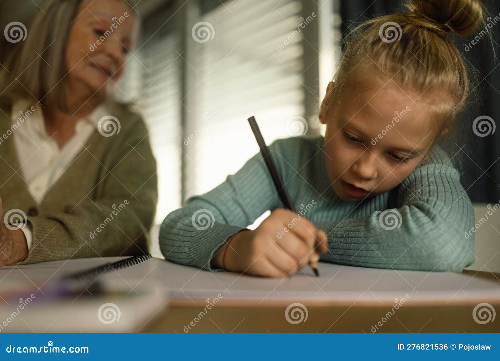 Senior Man Doing Homework with His Granddaughter. Stock Photo - Image ...