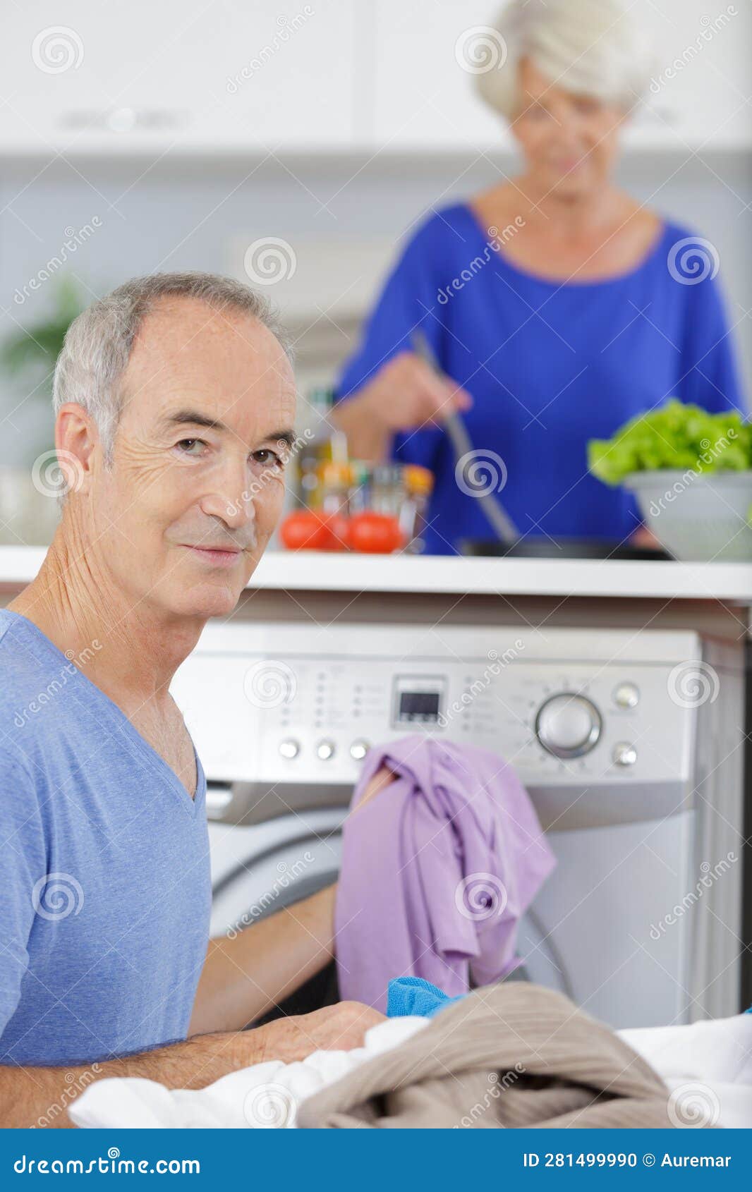 Senior Man Doing Laundry at Home Stock Photo - Image of chore, roll ...