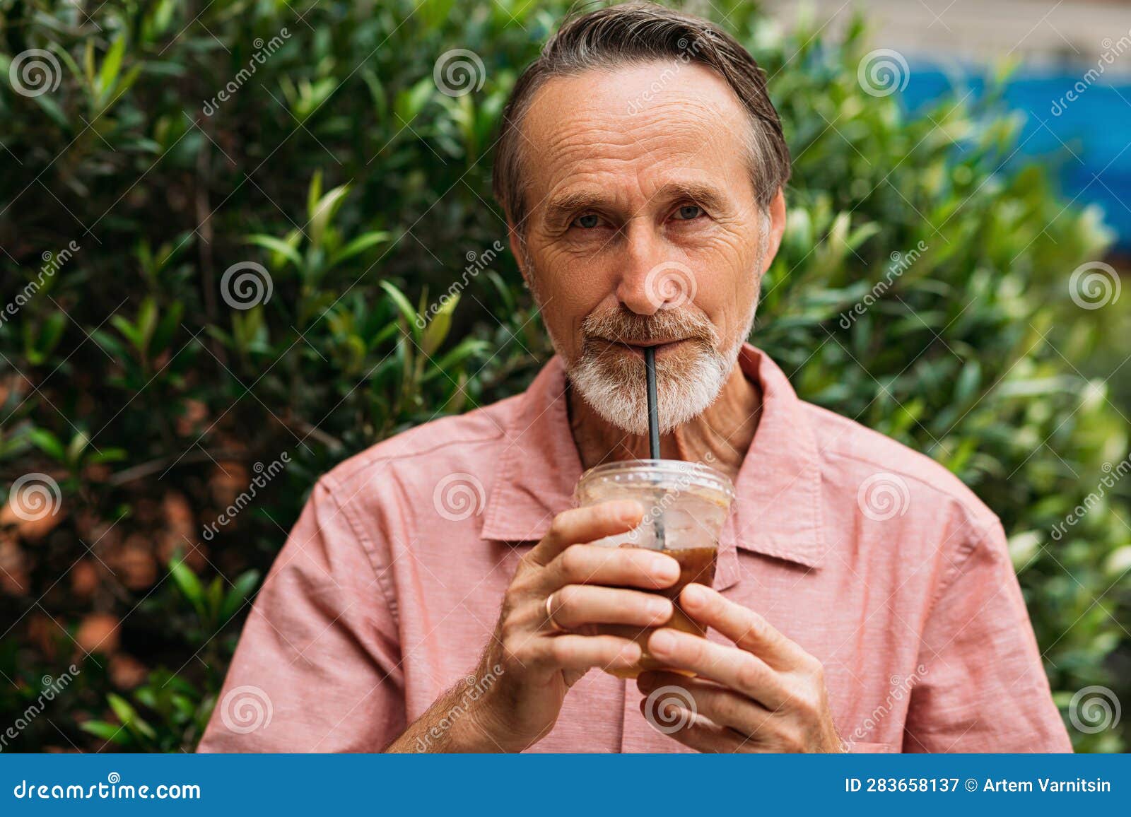 Senior Man Drinking a Smoothie and Looking at Camera Stock Image ...