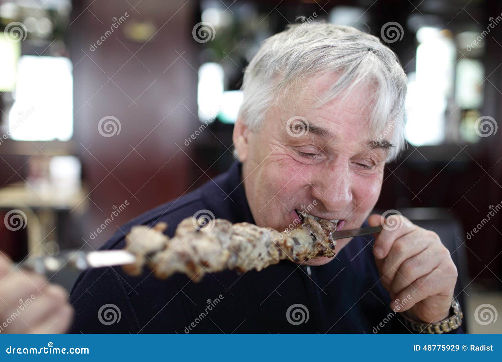 Senior Man Eating Kebab on a Stick Stock Image - Image of enjoyment ...