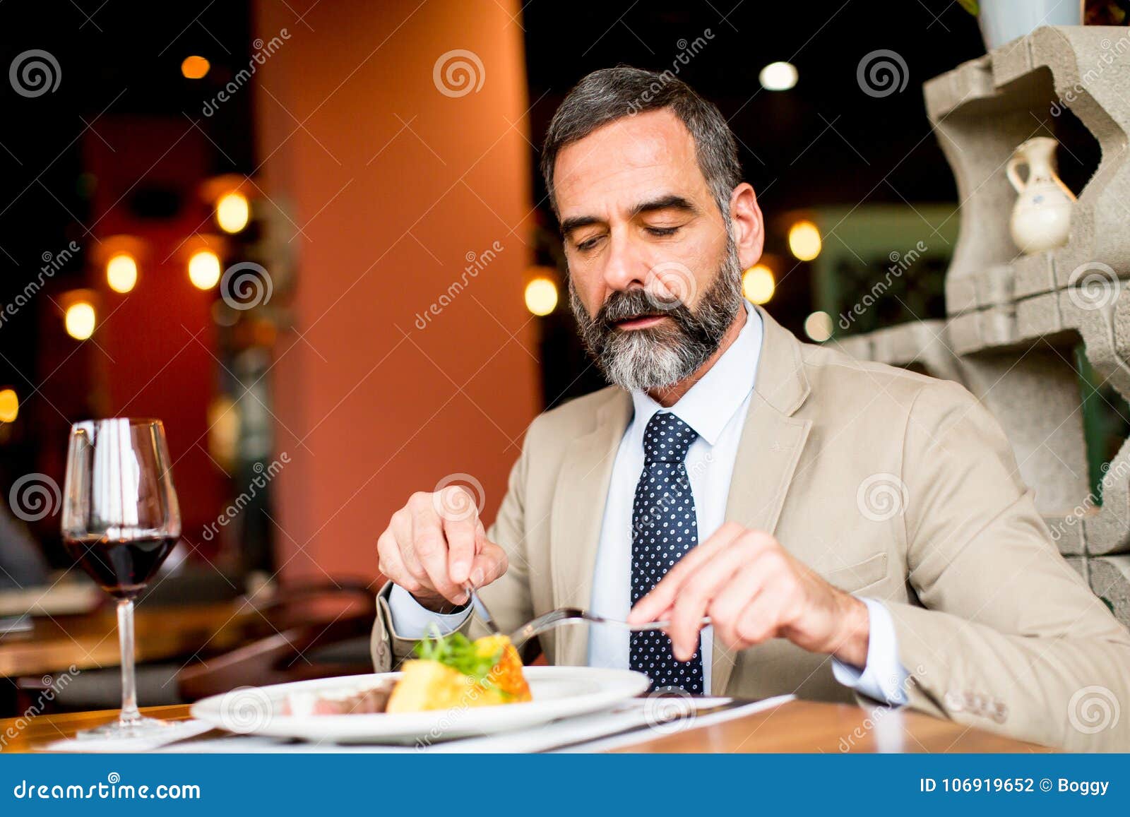 Senior Man Eating Lunch in Restaurant Stock Photo - Image of mealtime ...