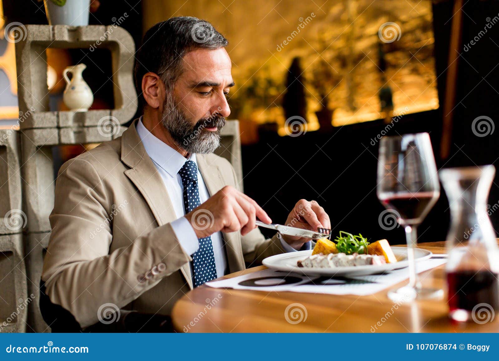 Senior Man Eating Lunch in Restaurant Stock Photo - Image of wine ...