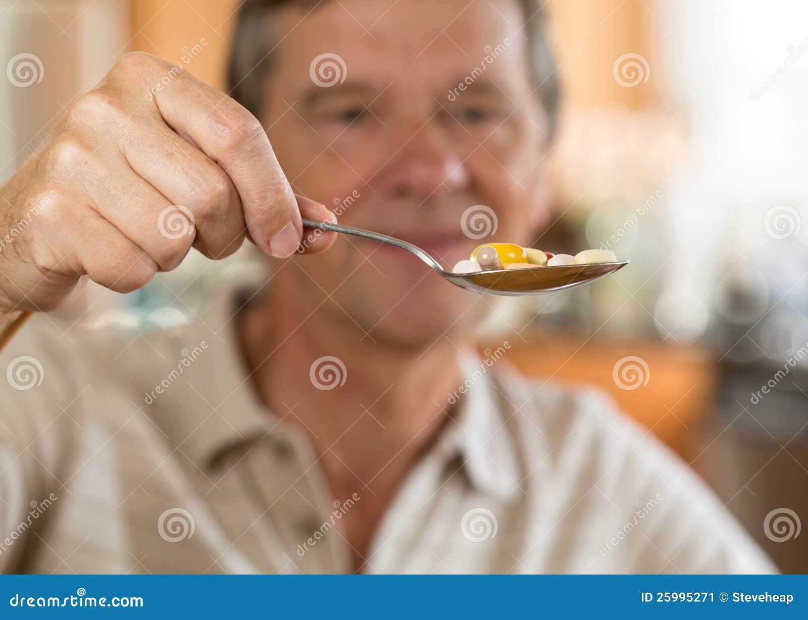 Senior Man Eating a Spoon of Vitamins Stock Image - Image of meal ...