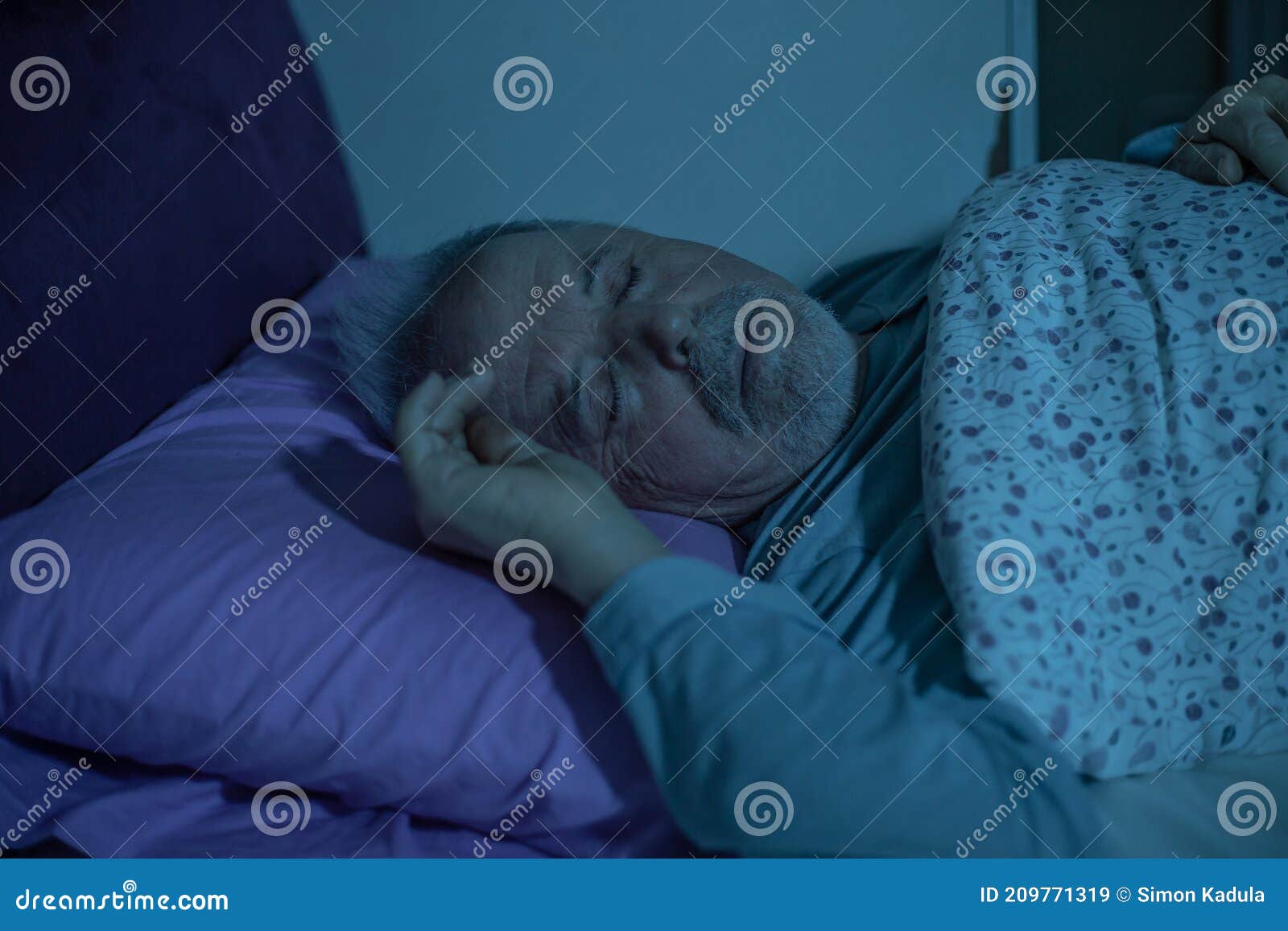 Senior Man Fall Asleep in the Bed during Midnight Stock Image - Image ...