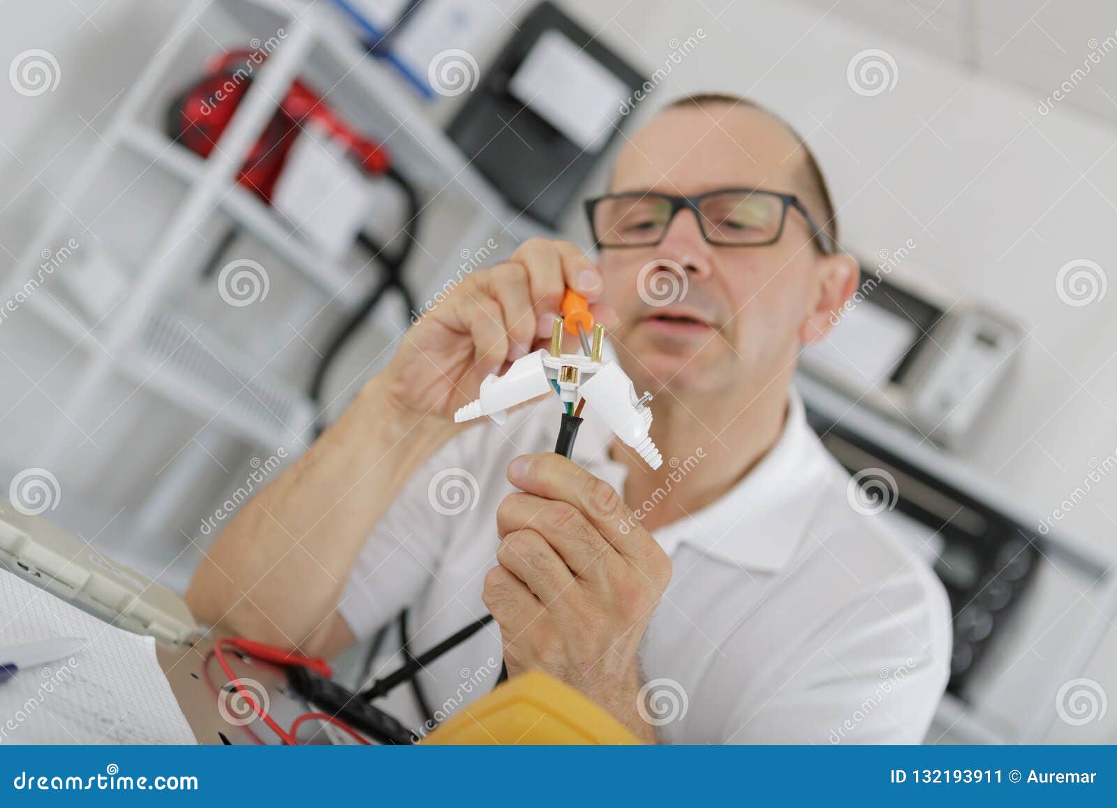 Senior Man Fixing Electric Plug Stock Image - Image of small ...