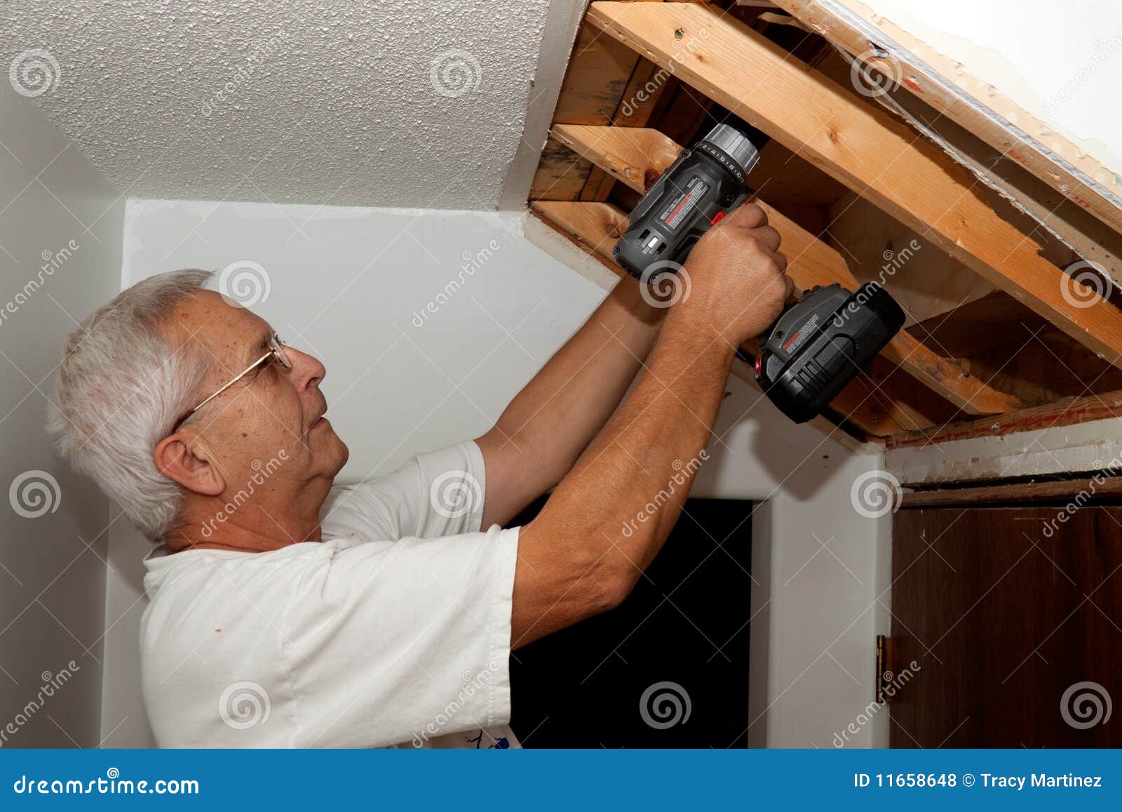 Senior man fixing stairs stock photo. Image of tool, drill - 11658648