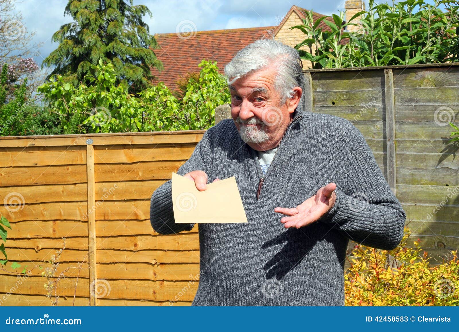 Senior Man Giving a Plain Brown Envelope. Stock Image - Image of secret ...