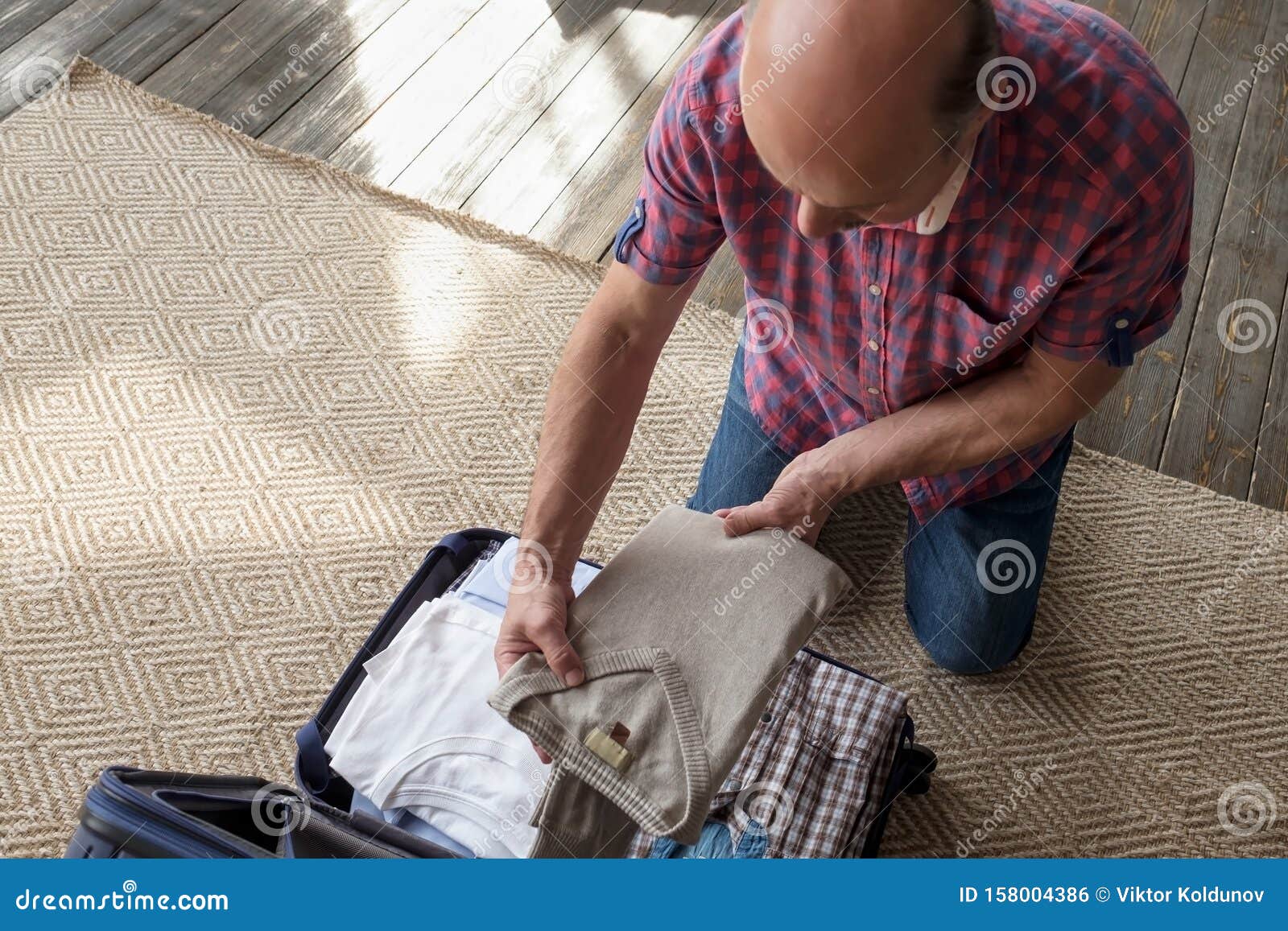 Senior Man Hands Packing Clothes in Suitcase. Stock Photo - Image of ...