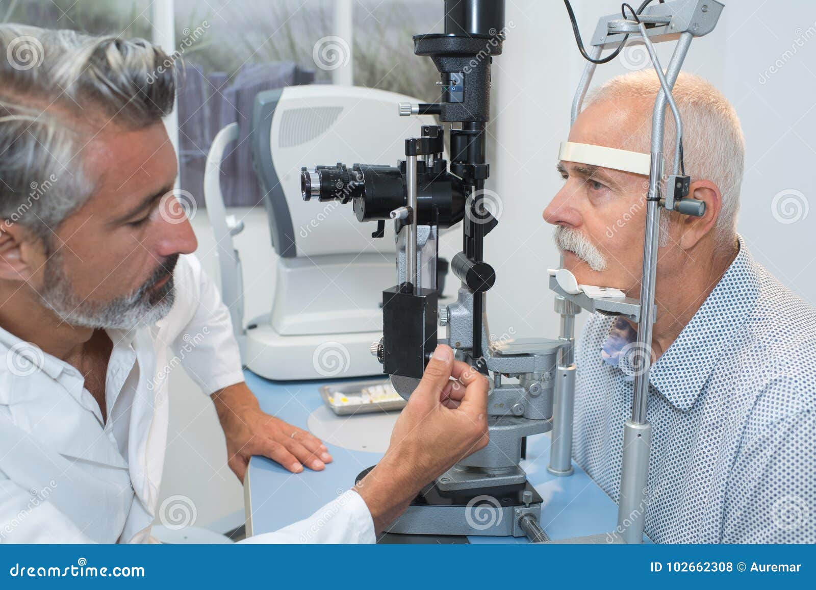 Senior man having eye test stock photo. Image of laboratory - 102662308
