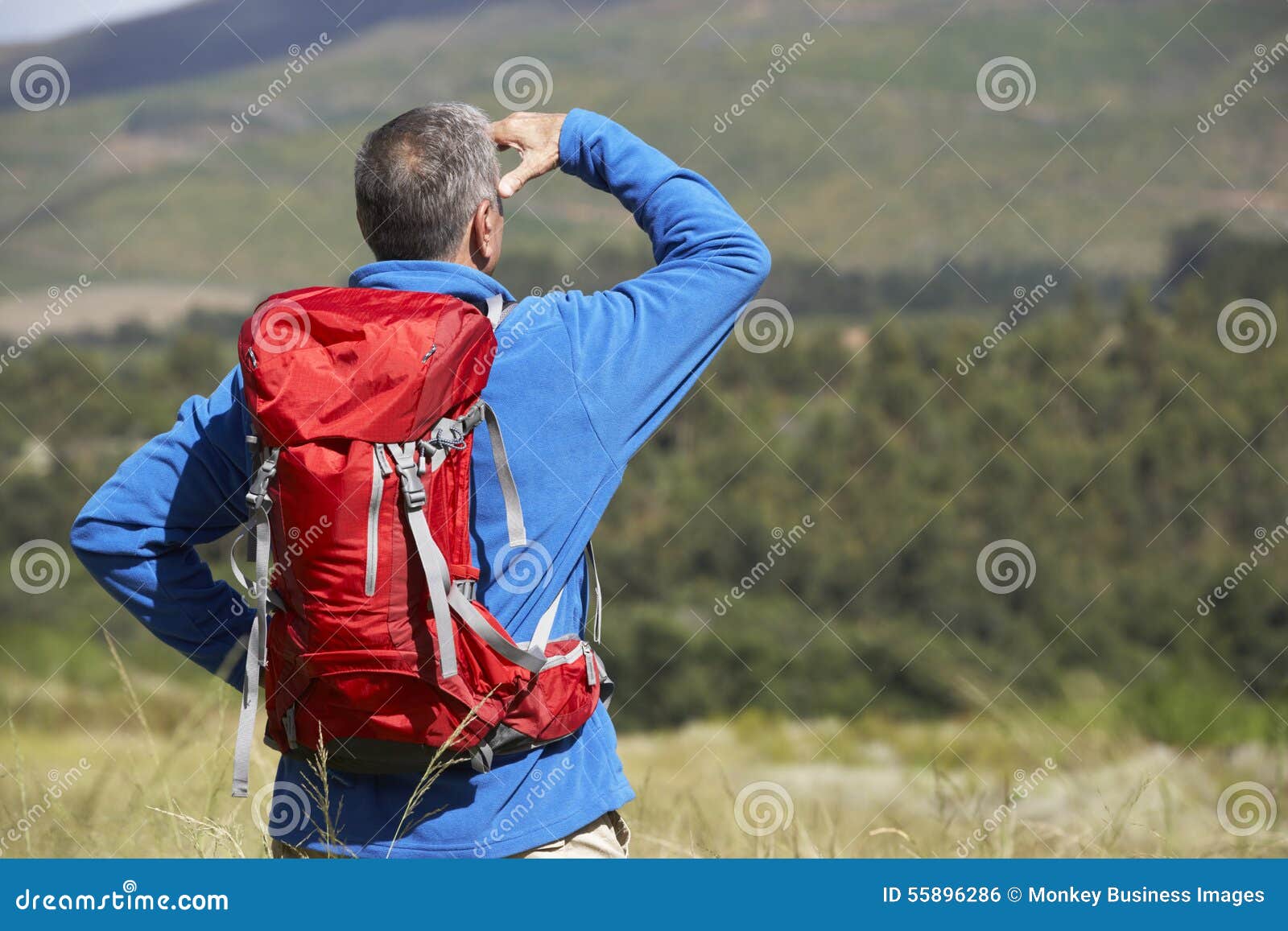 Senior Man on Hike through Beautiful Countryside Stock Photo - Image of ...