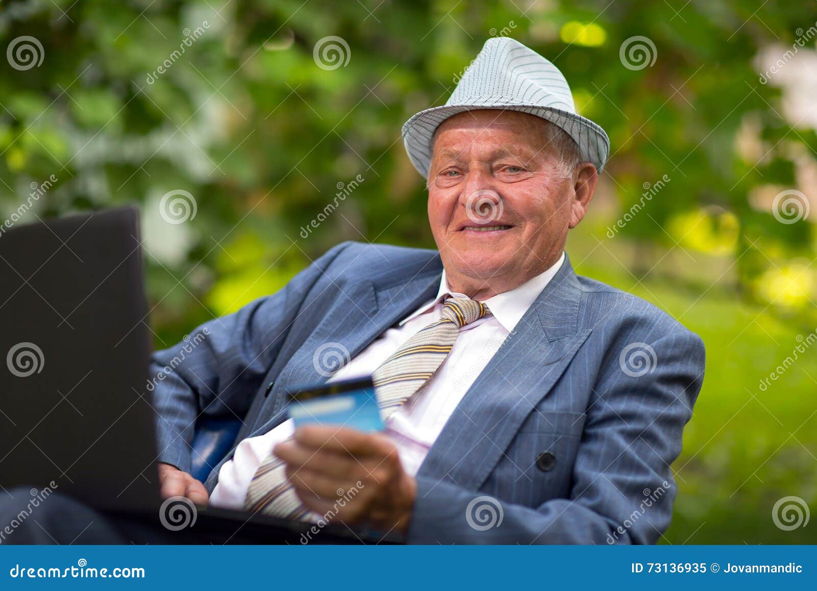 Senior Man Holding Credit Card Outdoors, Stock Image - Image of face ...