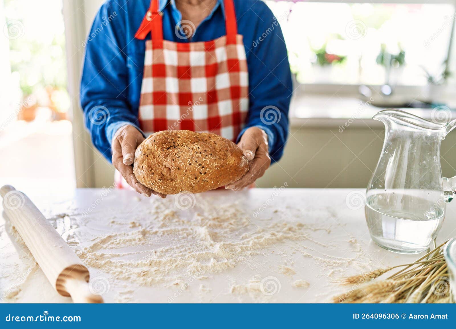 Senior Man Holding Wholemeal Bread at Kitchen Stock Photo - Image of ...
