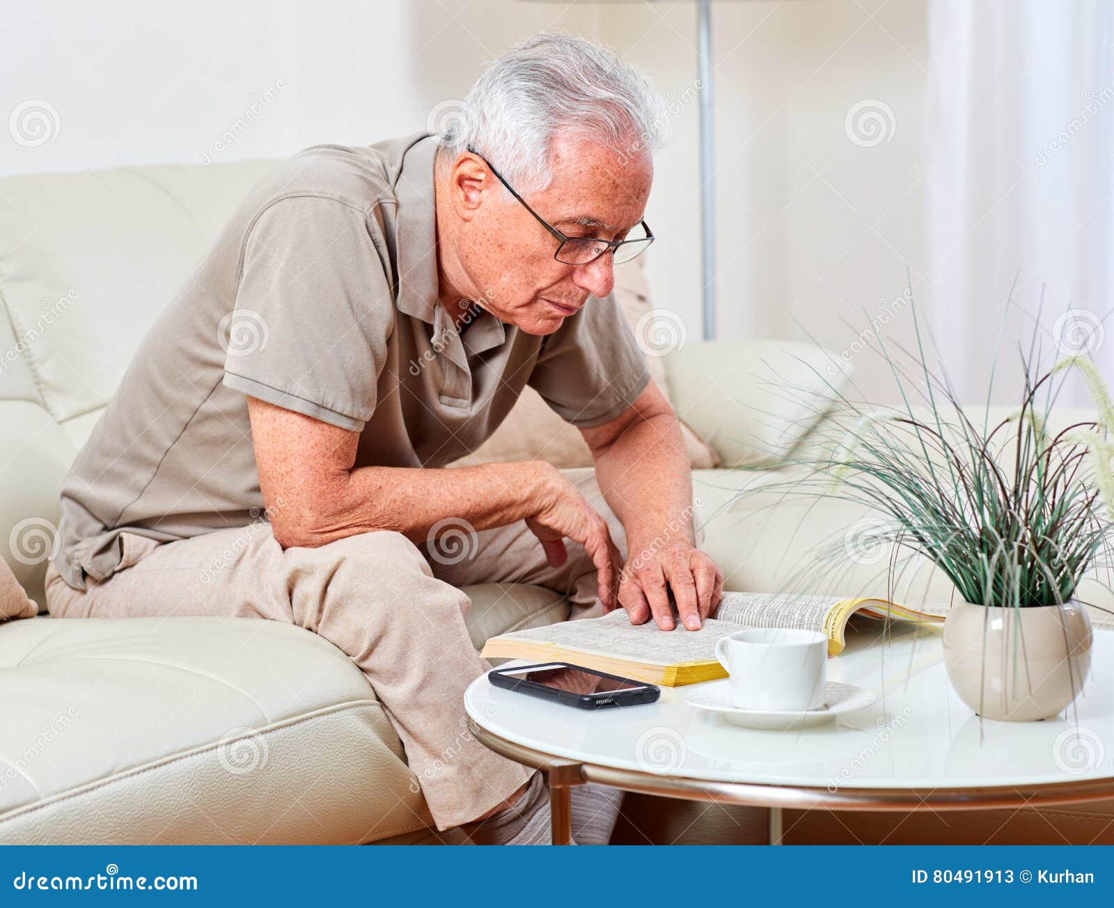 Senior man at home. stock image. Image of holding, male - 80491913