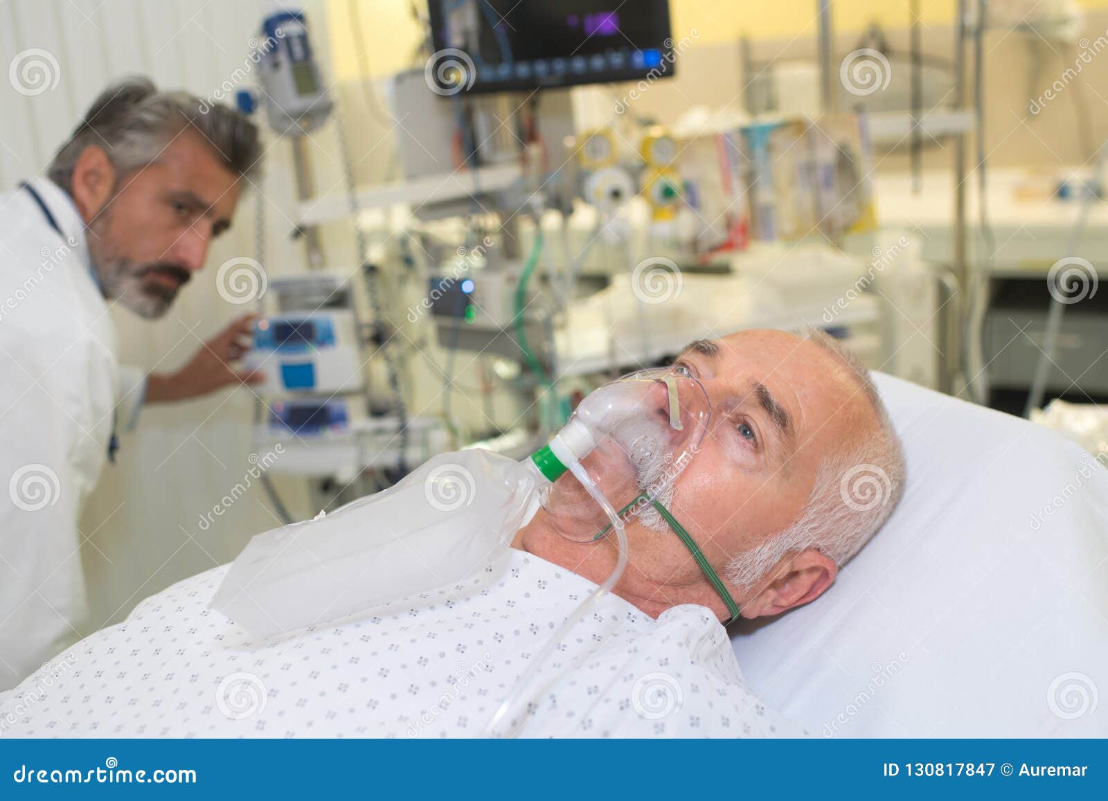 Senior Man Inhaling through Oxygen Mask in Clinic Stock Image - Image ...