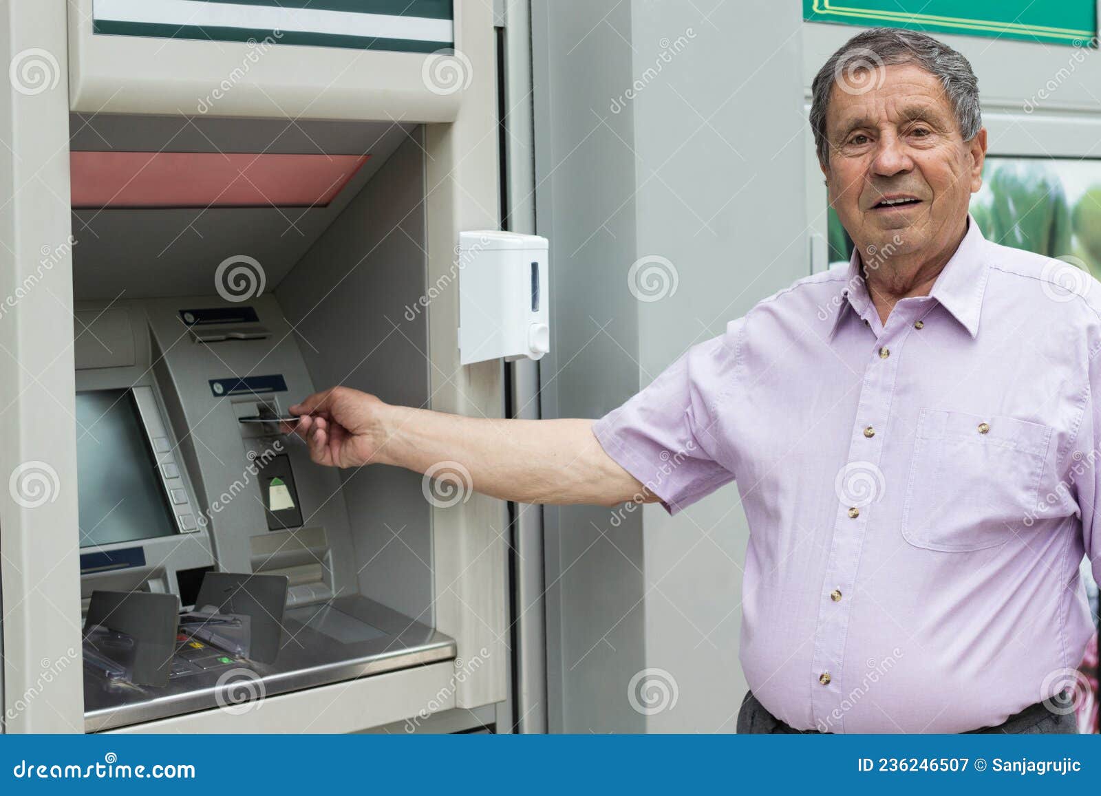 Senior Man Inserting Credit Card To ATM Stock Image - Image of ...