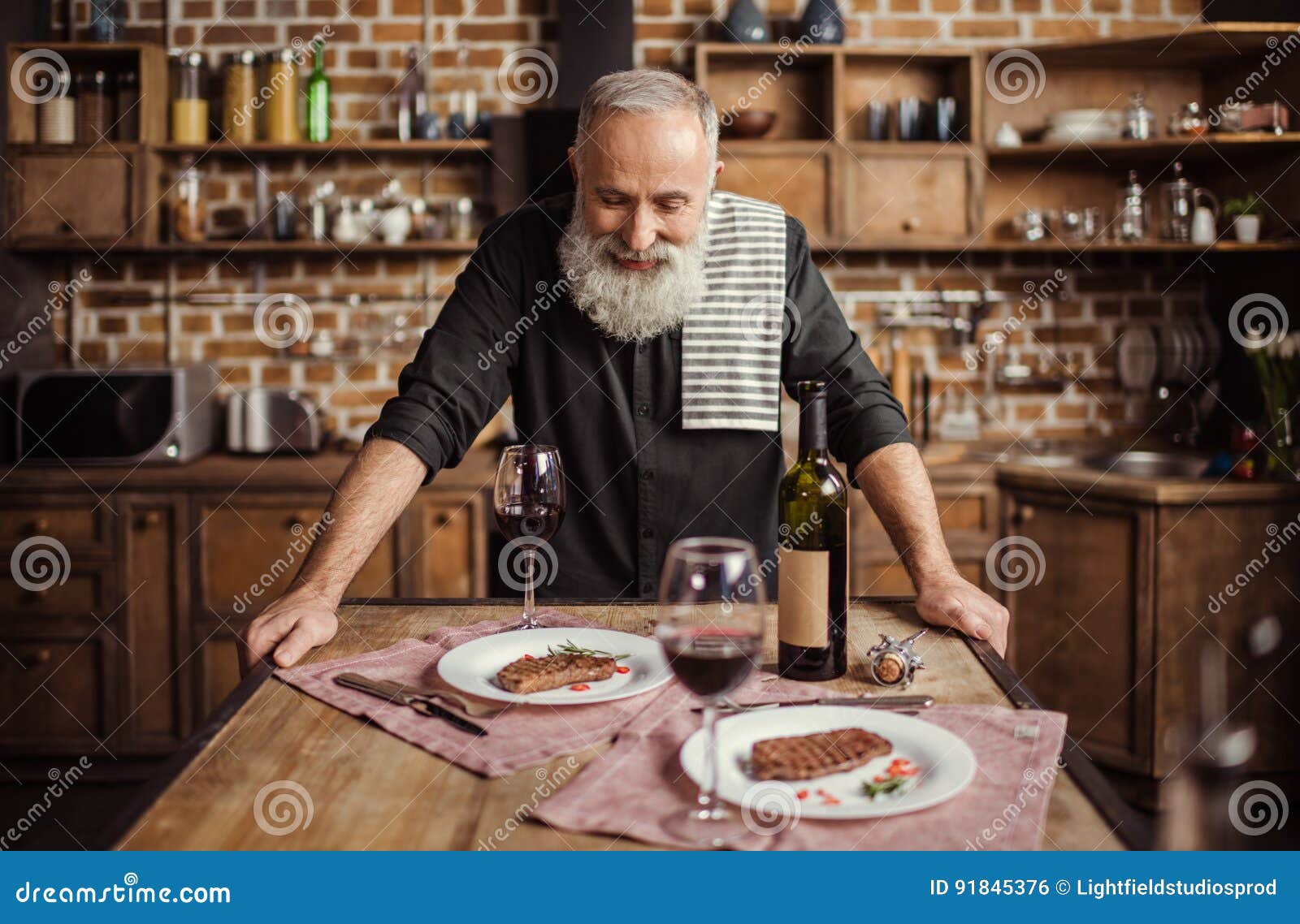 Senior man in kitchen stock photo. Image of beard, wine - 91845376
