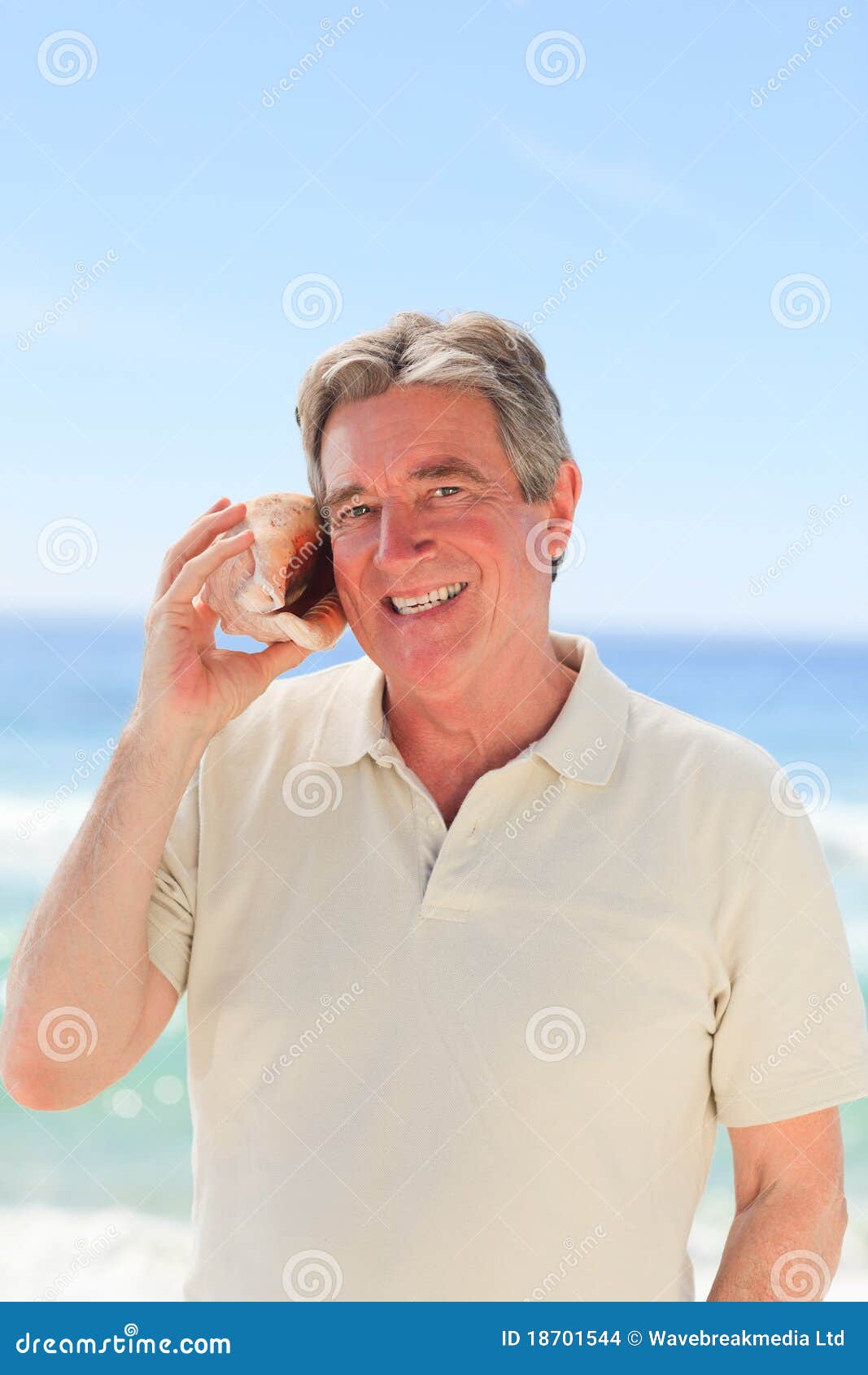 Senior Man Listening His Shell Stock Photo - Image of water, healthy ...
