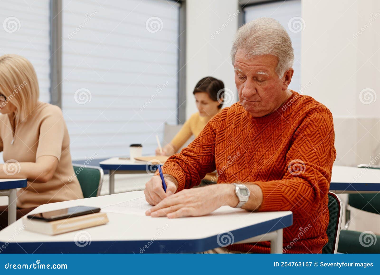 Senior Man Making Notes at Training Stock Image - Image of write ...