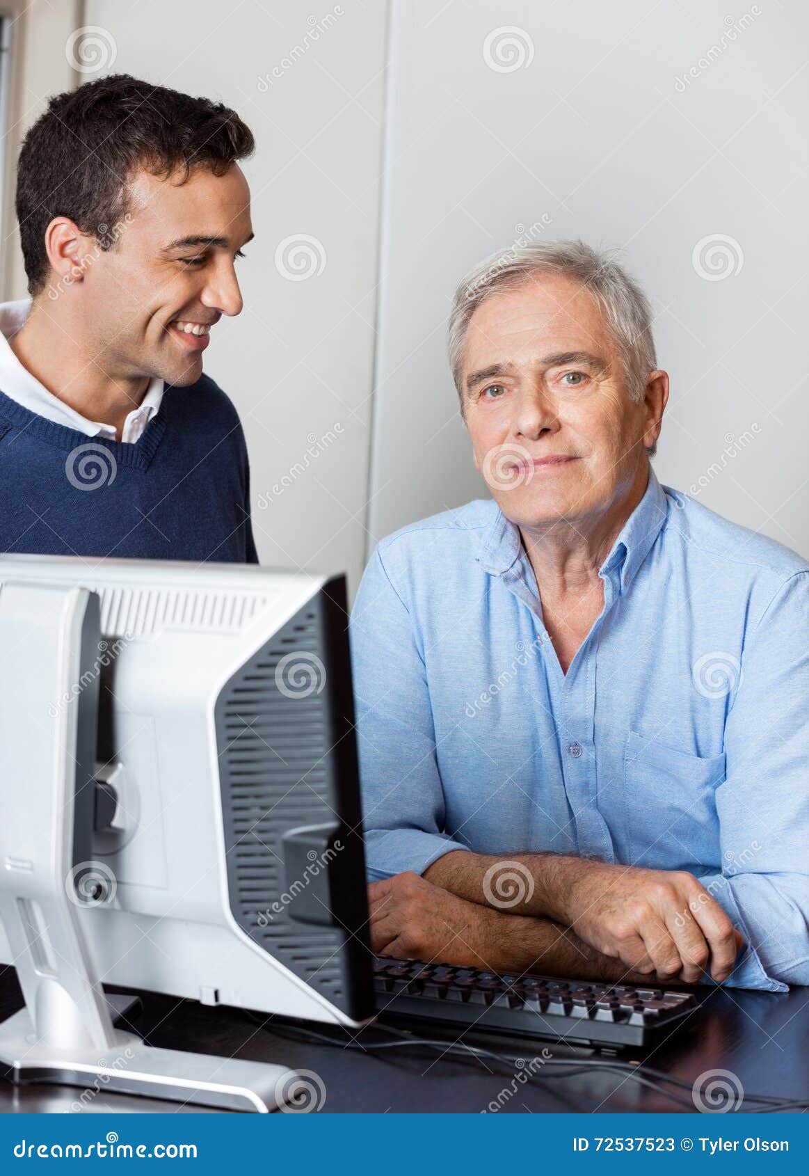 Senior Man with Male Teacher in Computer Class Stock Image - Image of ...