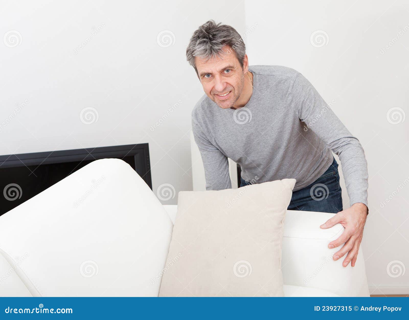Senior man moving sofa stock image. Image of house, hair - 23927315