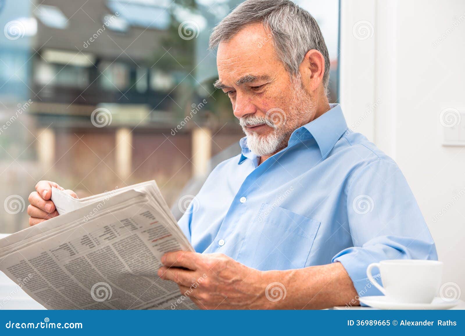 Senior man with newspaper stock image. Image of male - 36989665