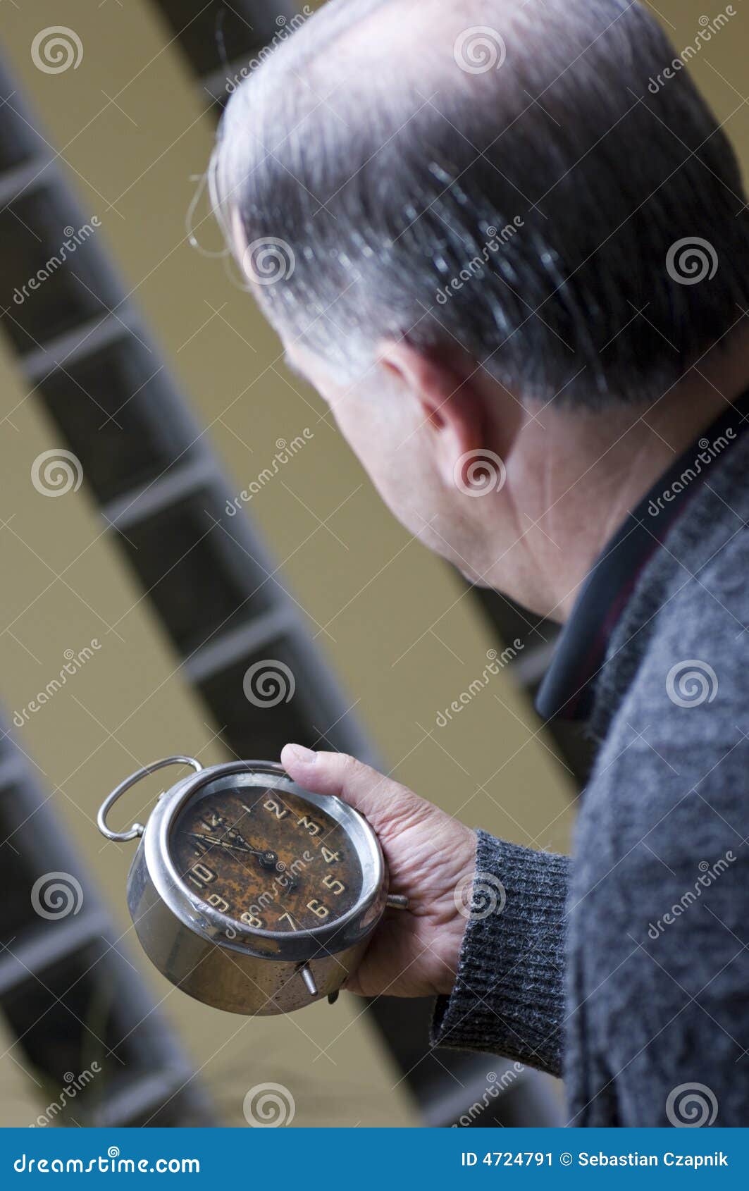 Senior man with old clock stock image. Image of alarm - 4724791