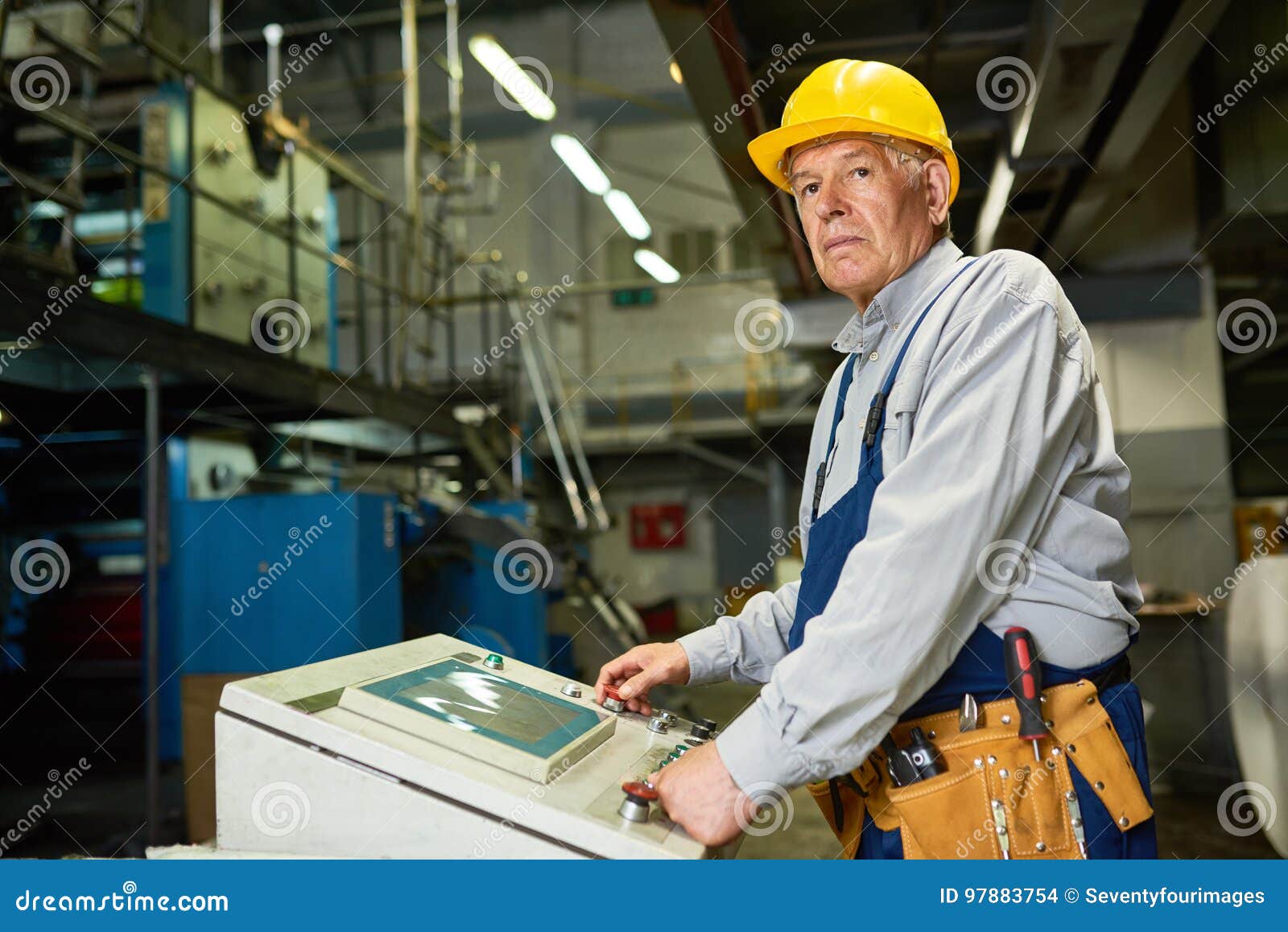 Senior Man Operating Machine Units at Factory Stock Photo - Image of ...