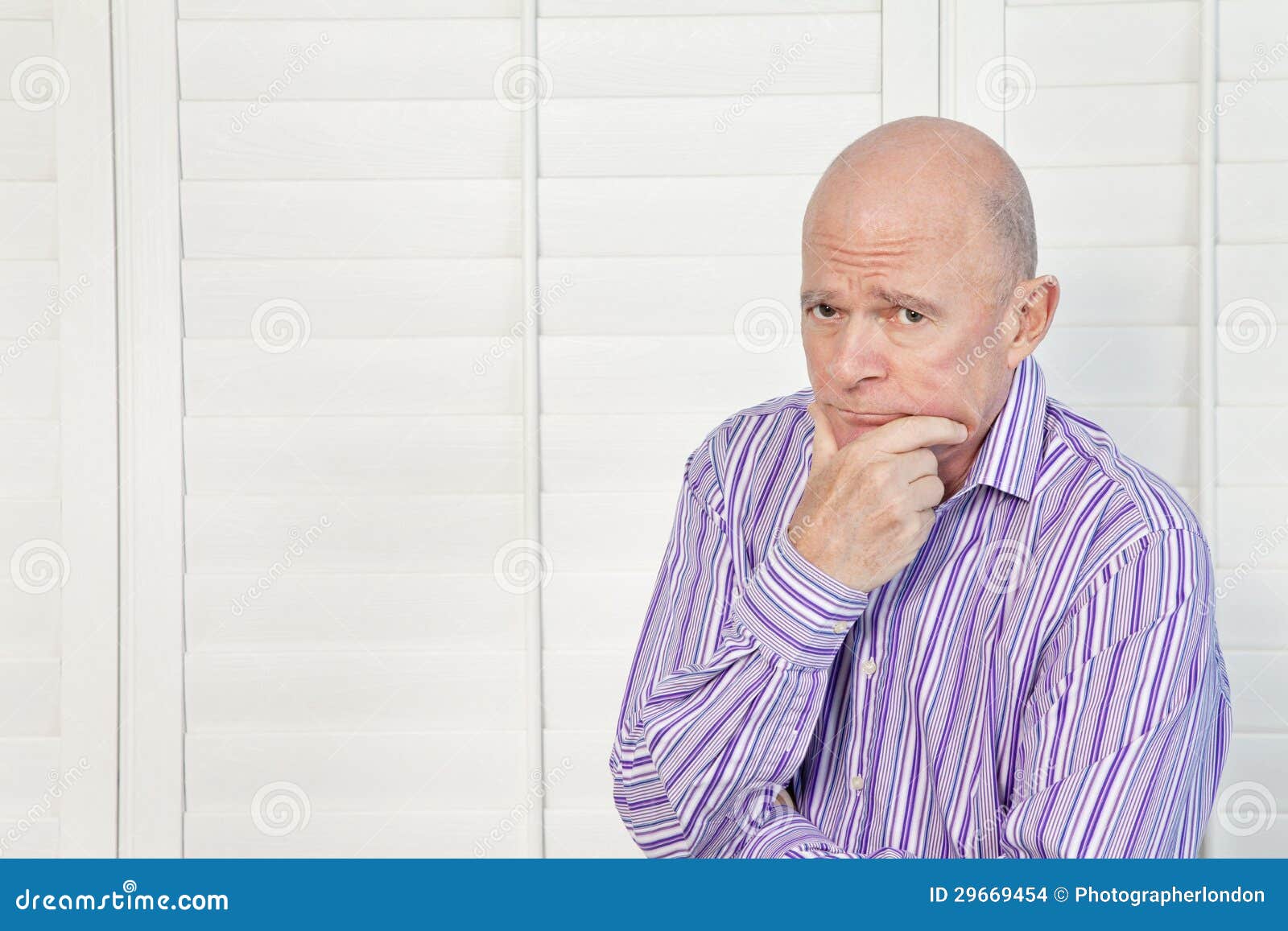Senior Man in Pensive Mood with Hand on Chin Stock Photo - Image of ...