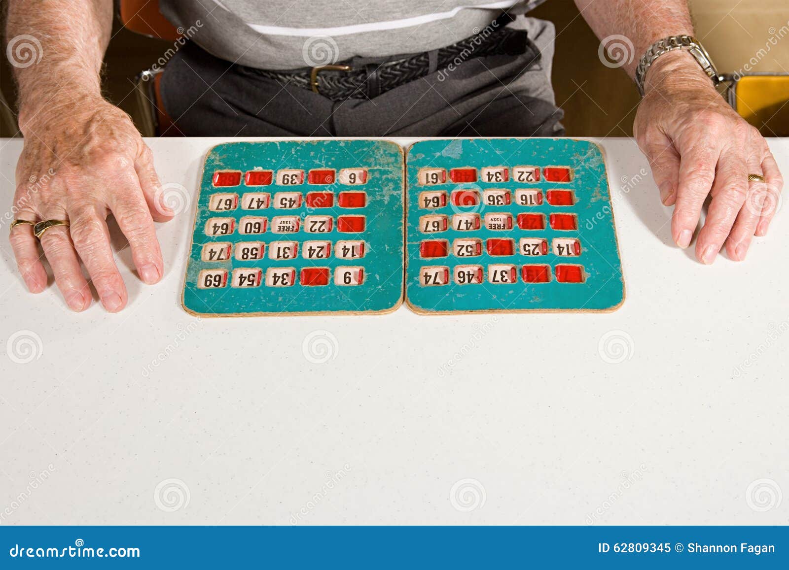 Senior man playing bingo stock image. Image of alone - 62809345