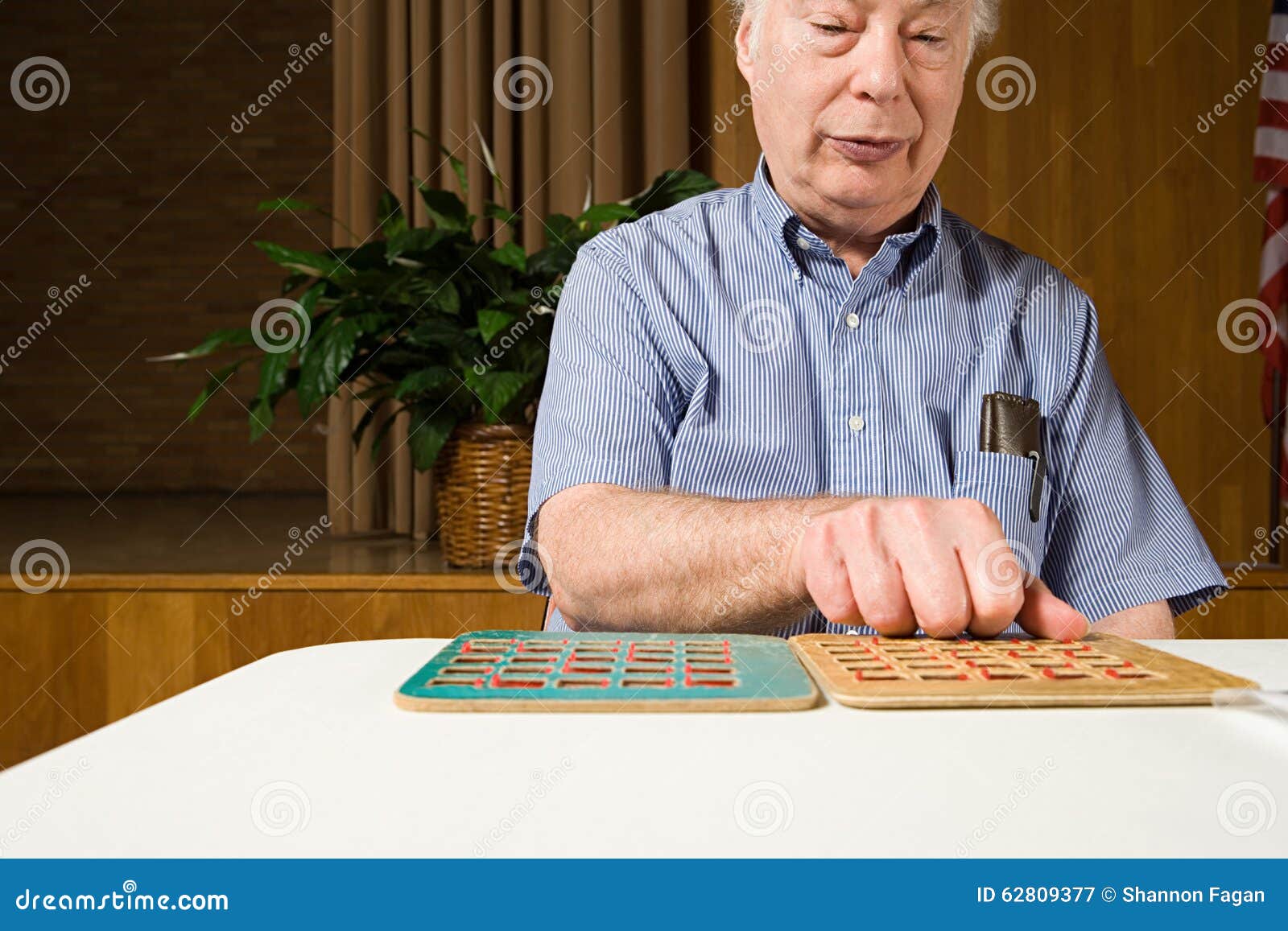 Senior man playing bingo stock image. Image of game, leisure - 62809377