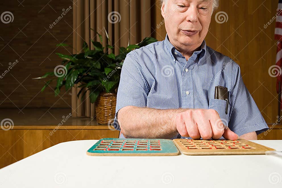 Senior man playing bingo stock image. Image of game, leisure - 62809377