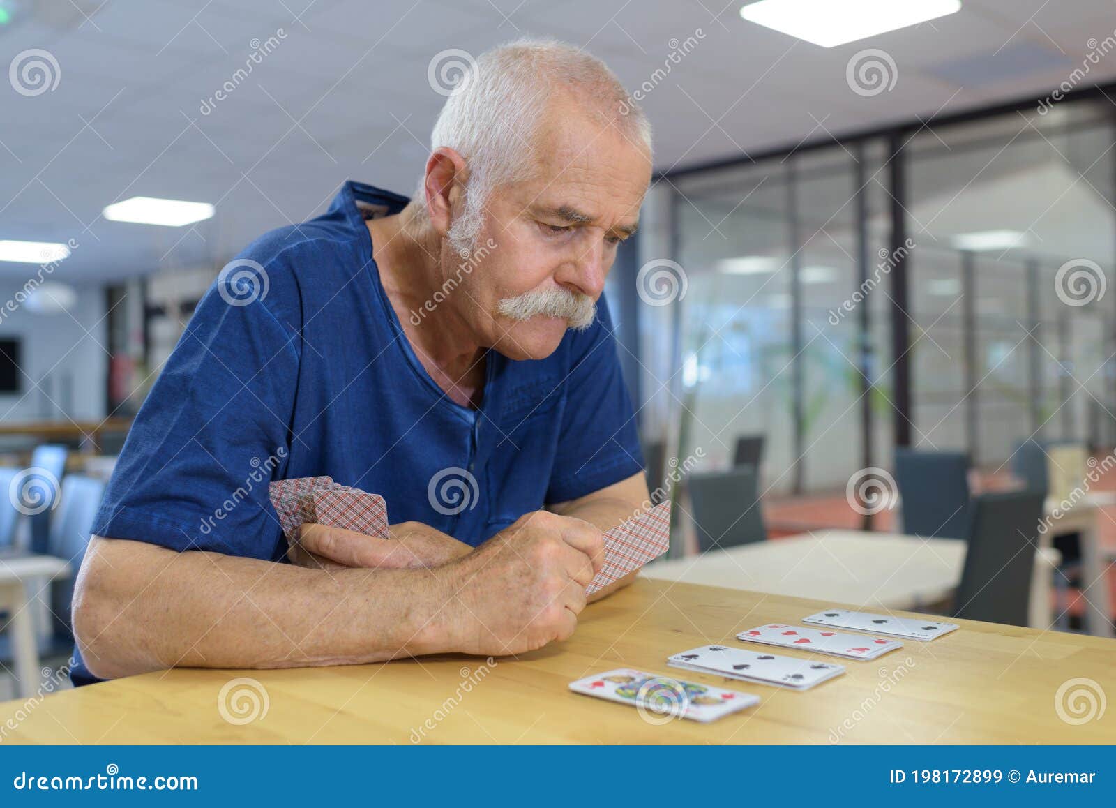 Senior Man Playing Cards Alone Stock Image - Image of alone, playing ...