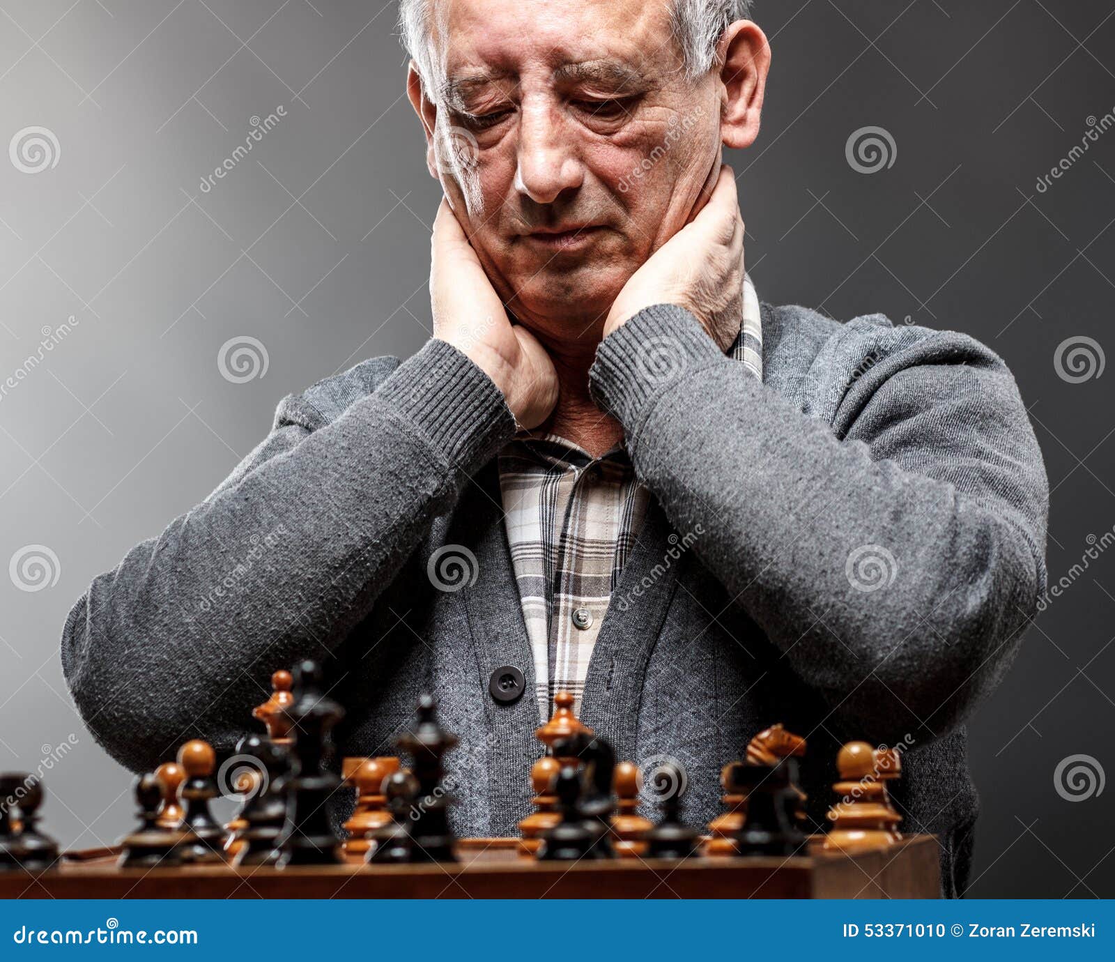 Senior man playing chess stock photo. Image of competition - 53371010