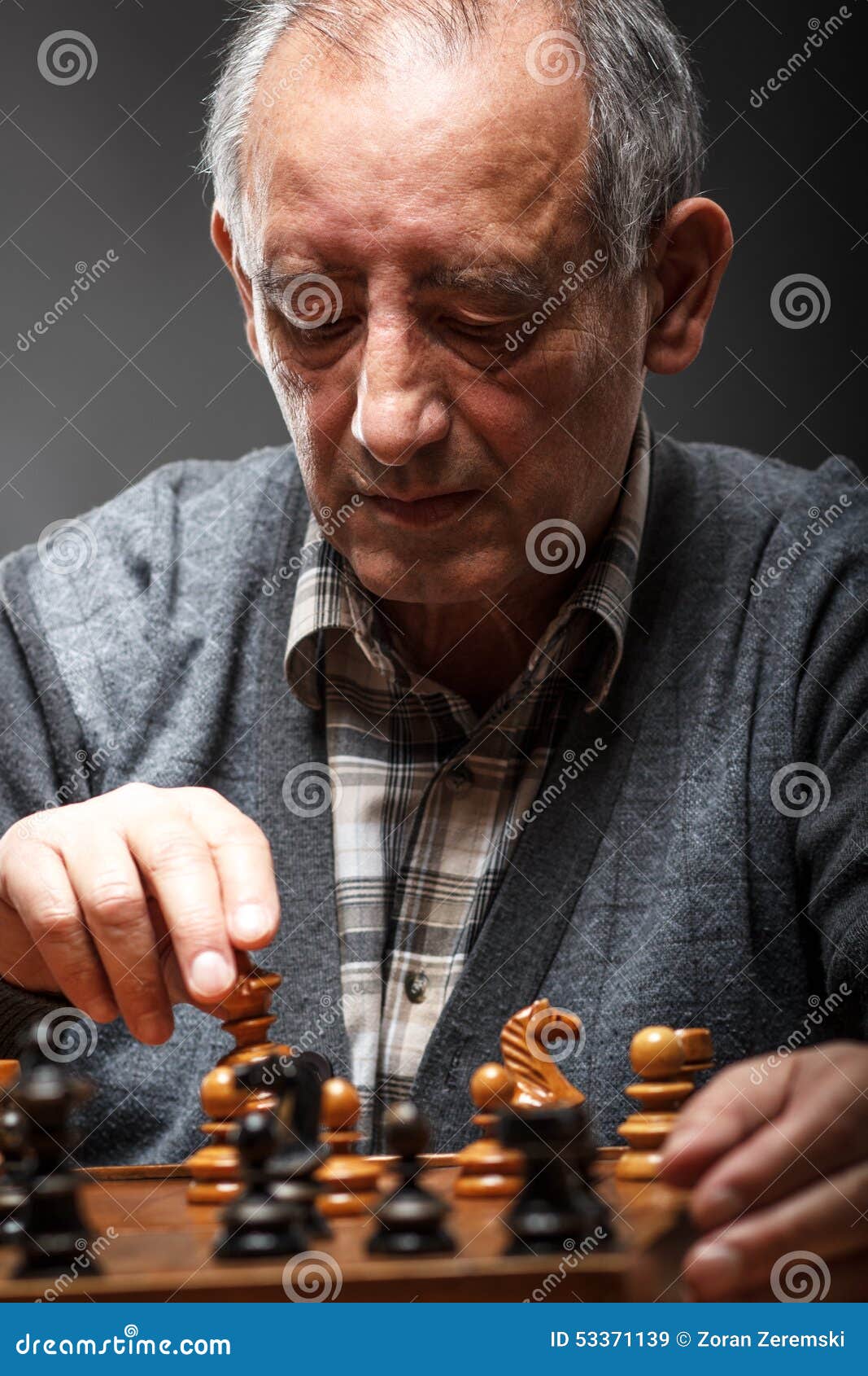Senior man playing chess stock image. Image of competitive - 53371139