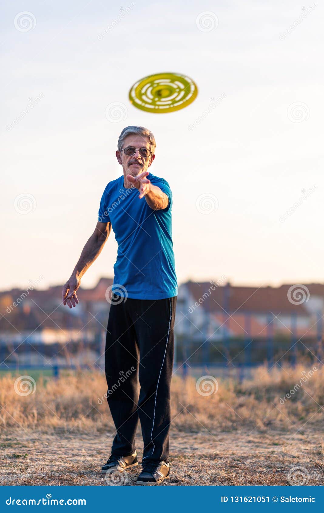 Senior Man Playing Frisbee in the Park Stock Image - Image of casual ...